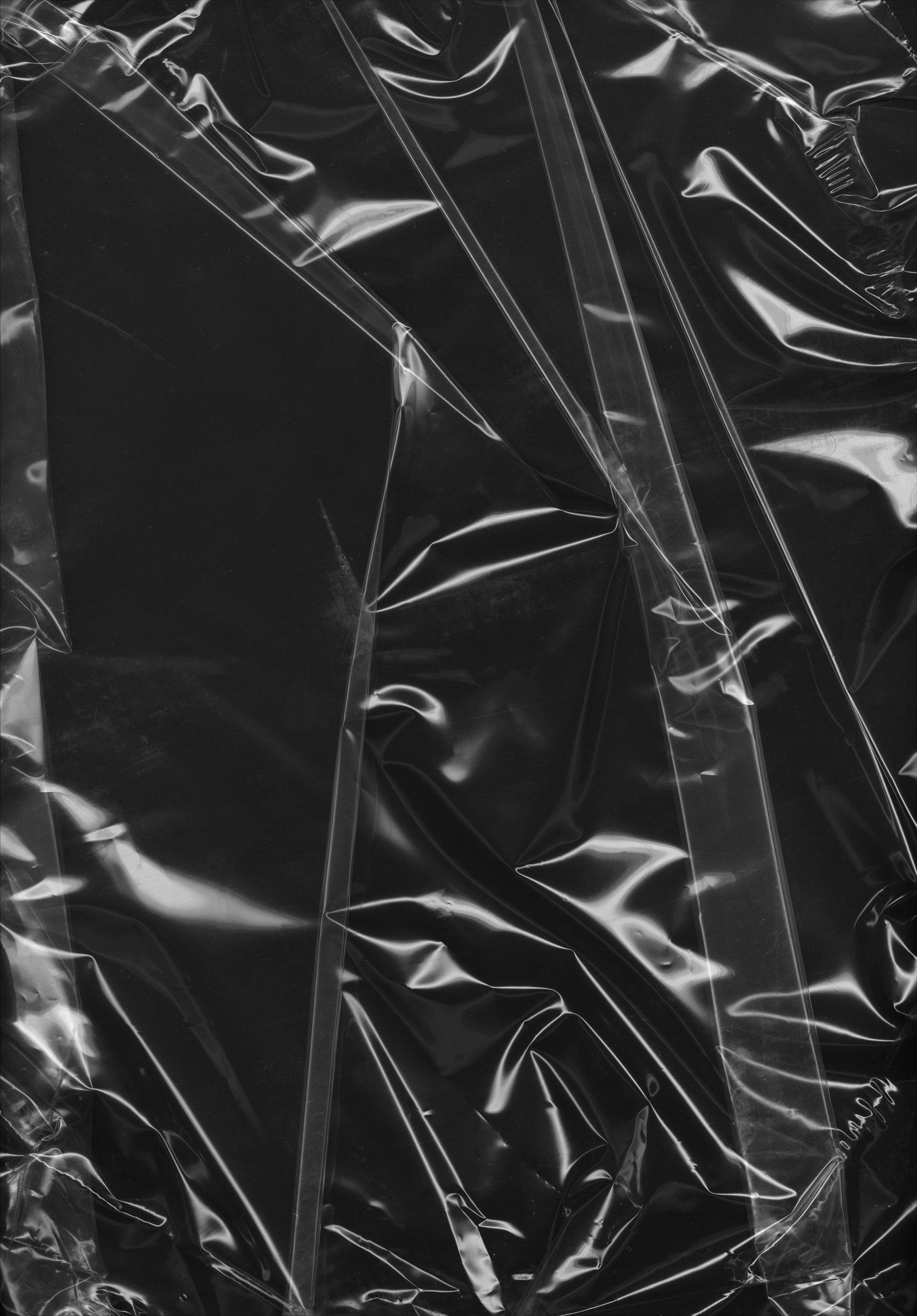 Crumpled Black Plastic Material · Free Stock Photo