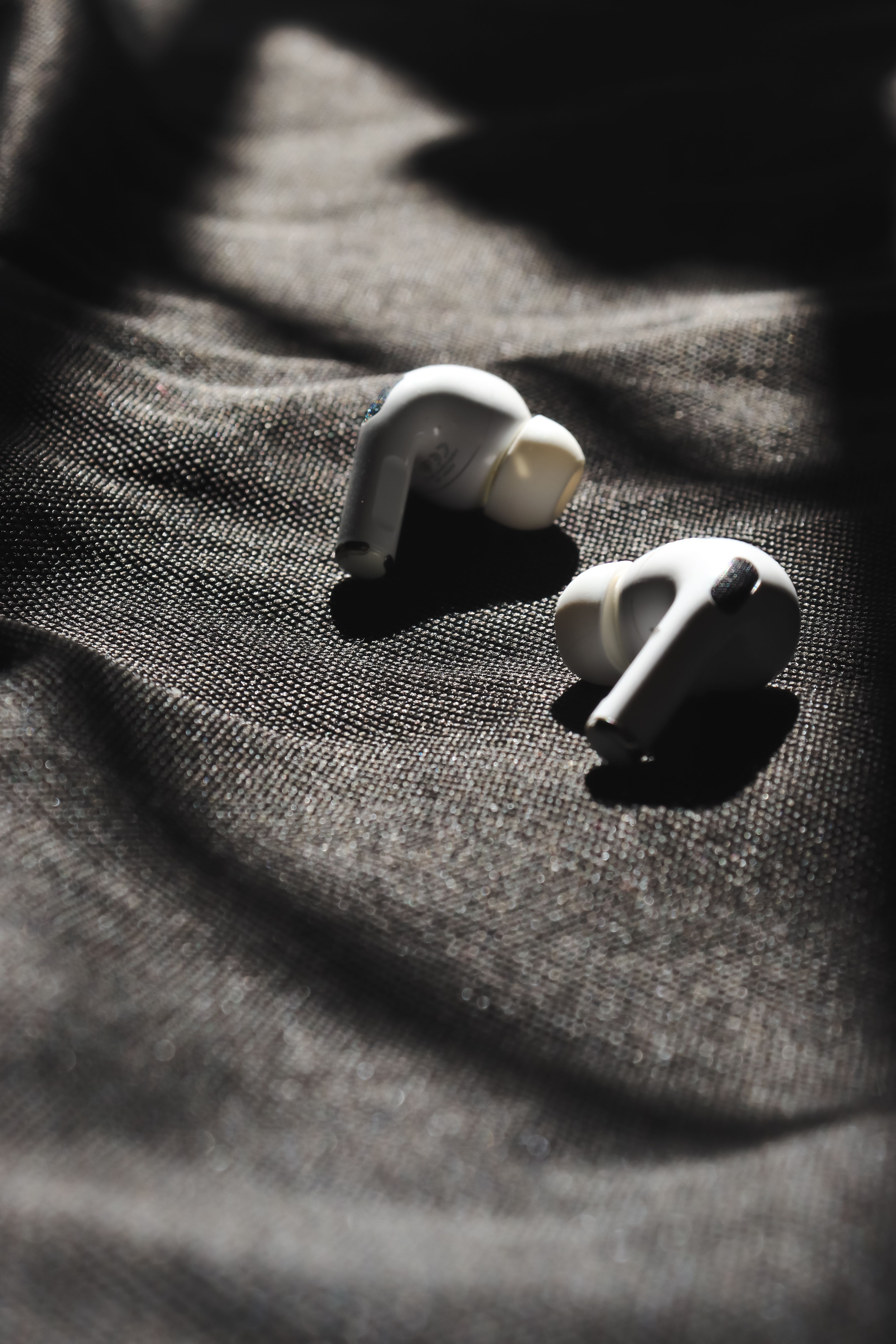 Earphones on Black Background · Free Stock Photo