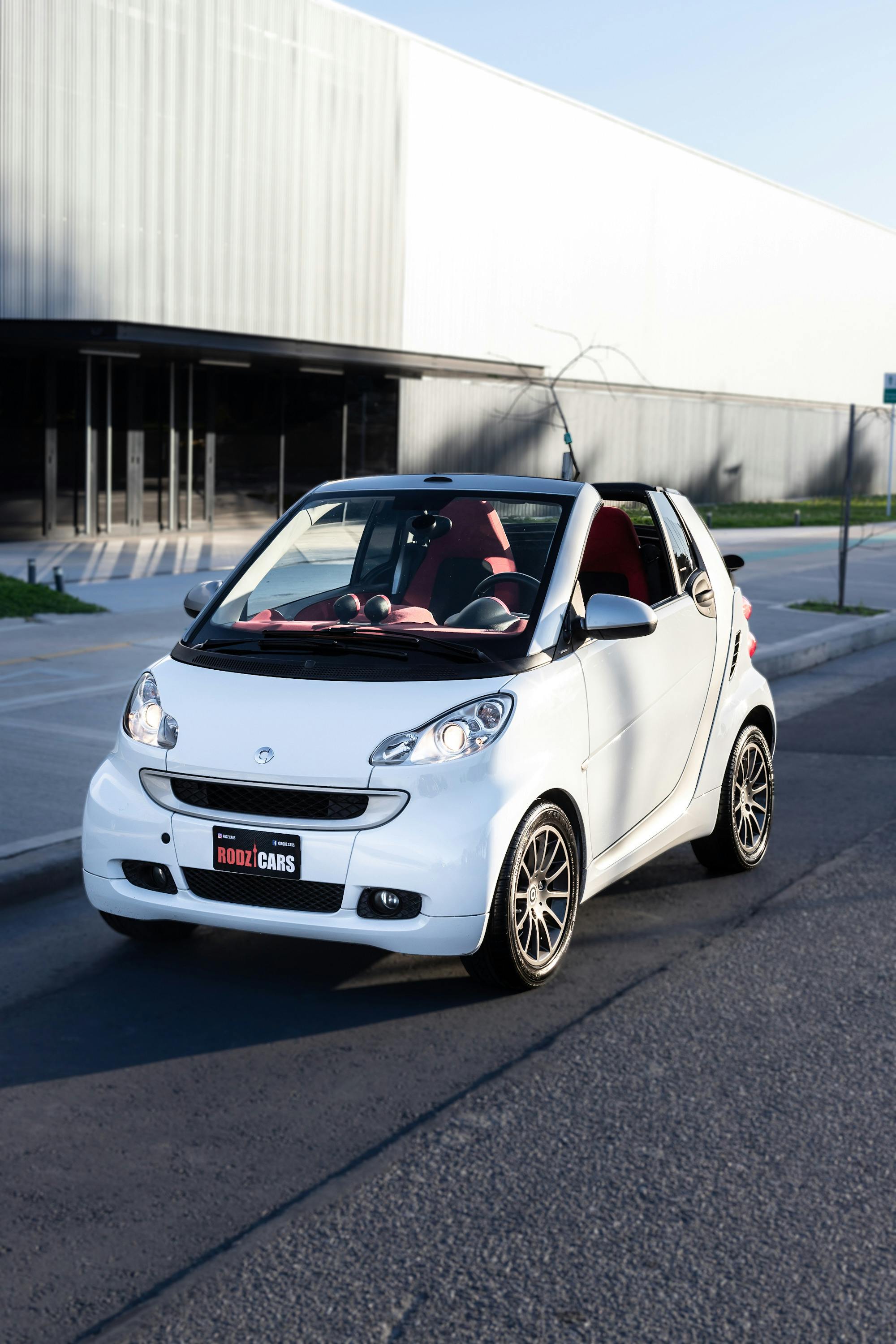 Grayscale Photo of Smart Fortwo · Free Stock Photo