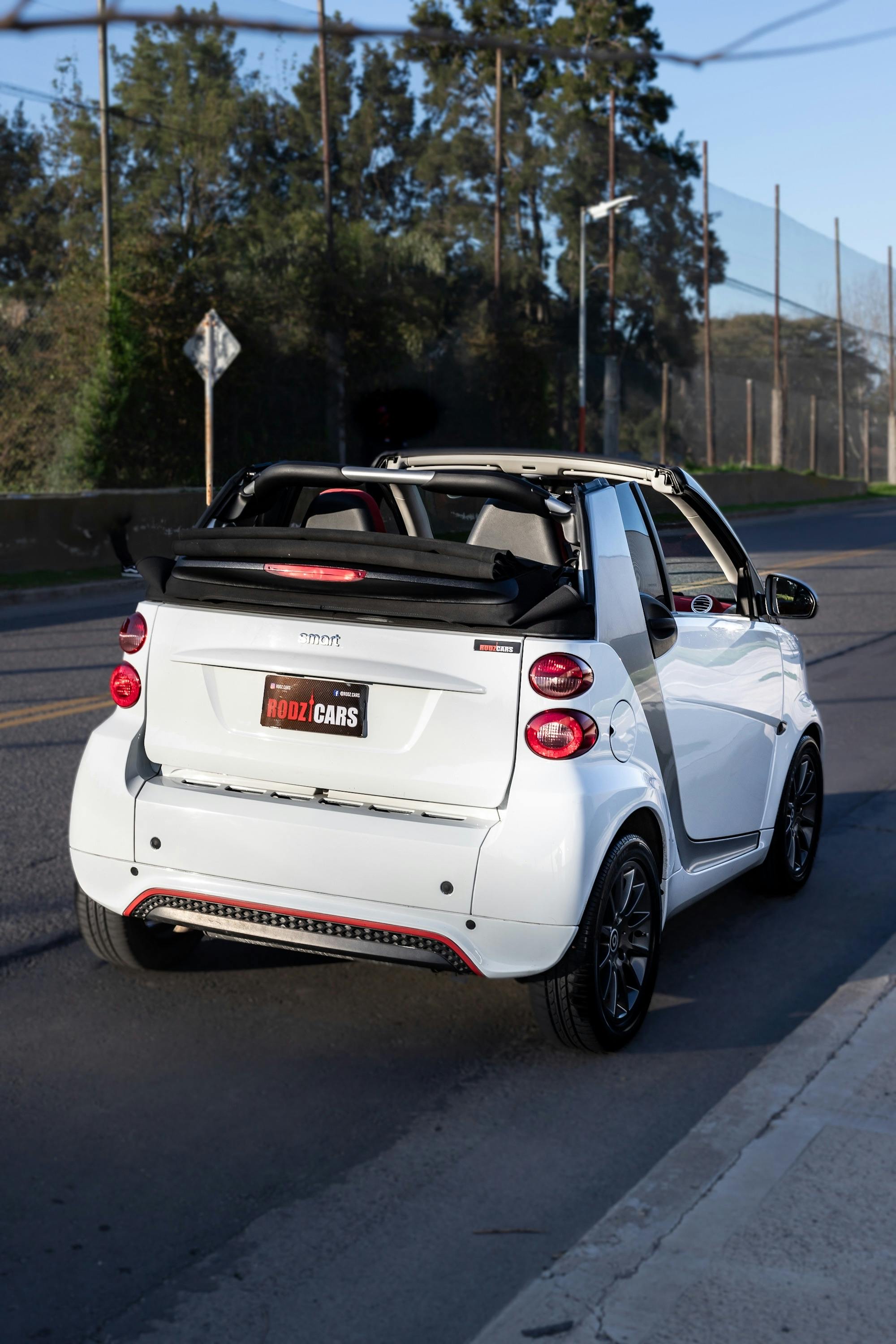 Small Convertible Car on the Street · Free Stock Photo