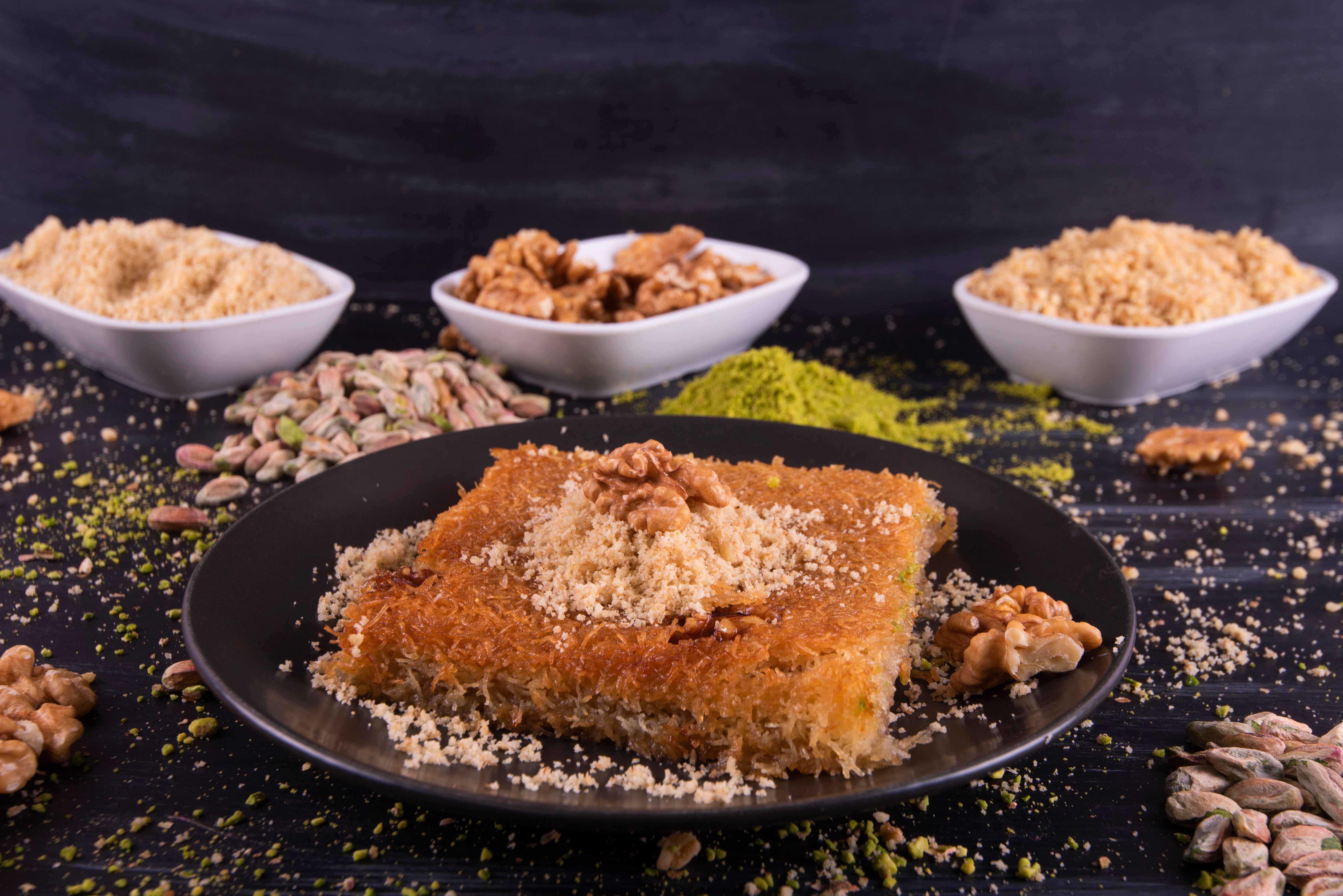 Arabic Dessert Knafeh Sprinkled with Walnuts · Free Stock Photo