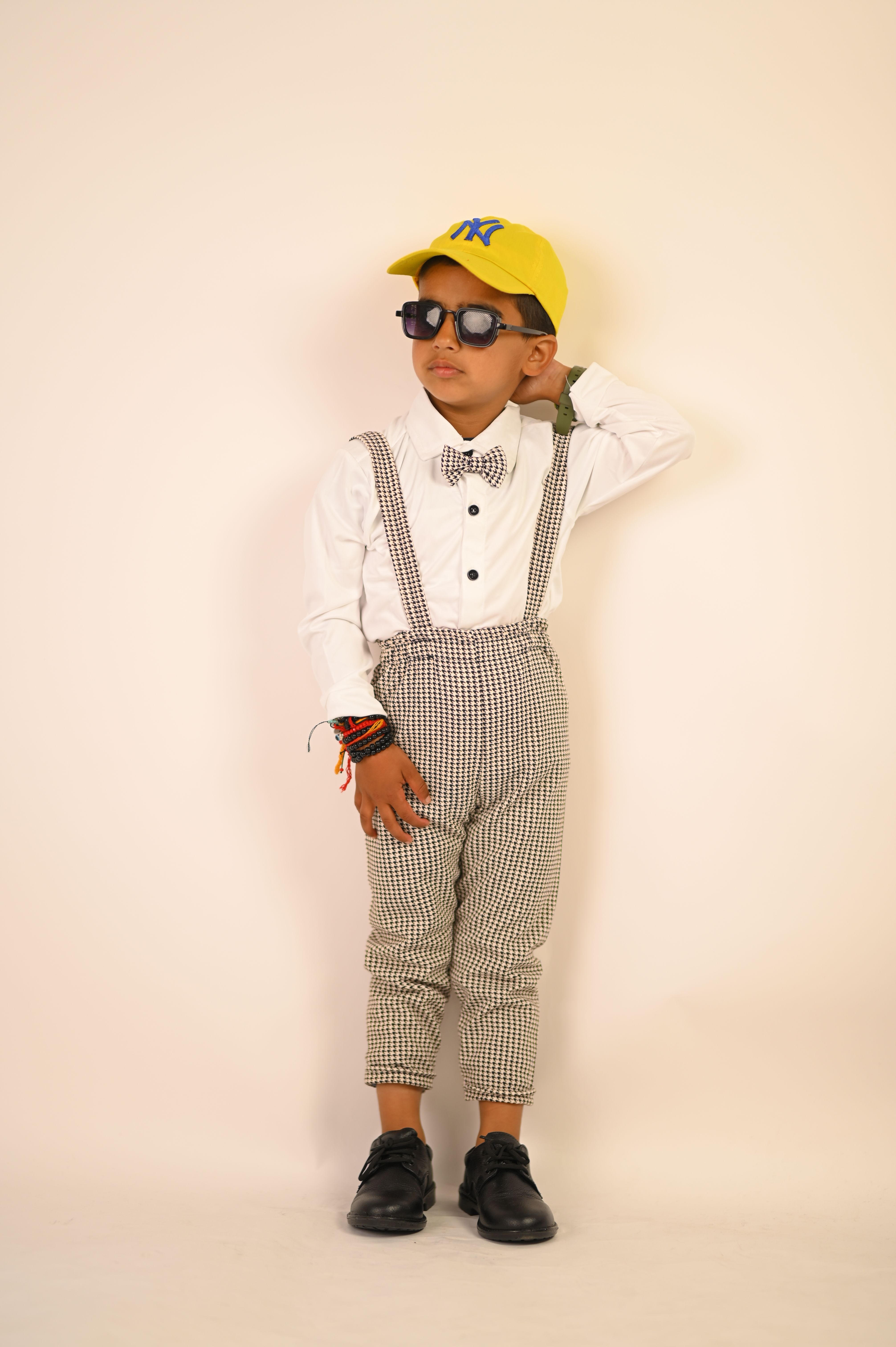 Boy Wearing Elegant Suit and Cap · Free Stock Photo
