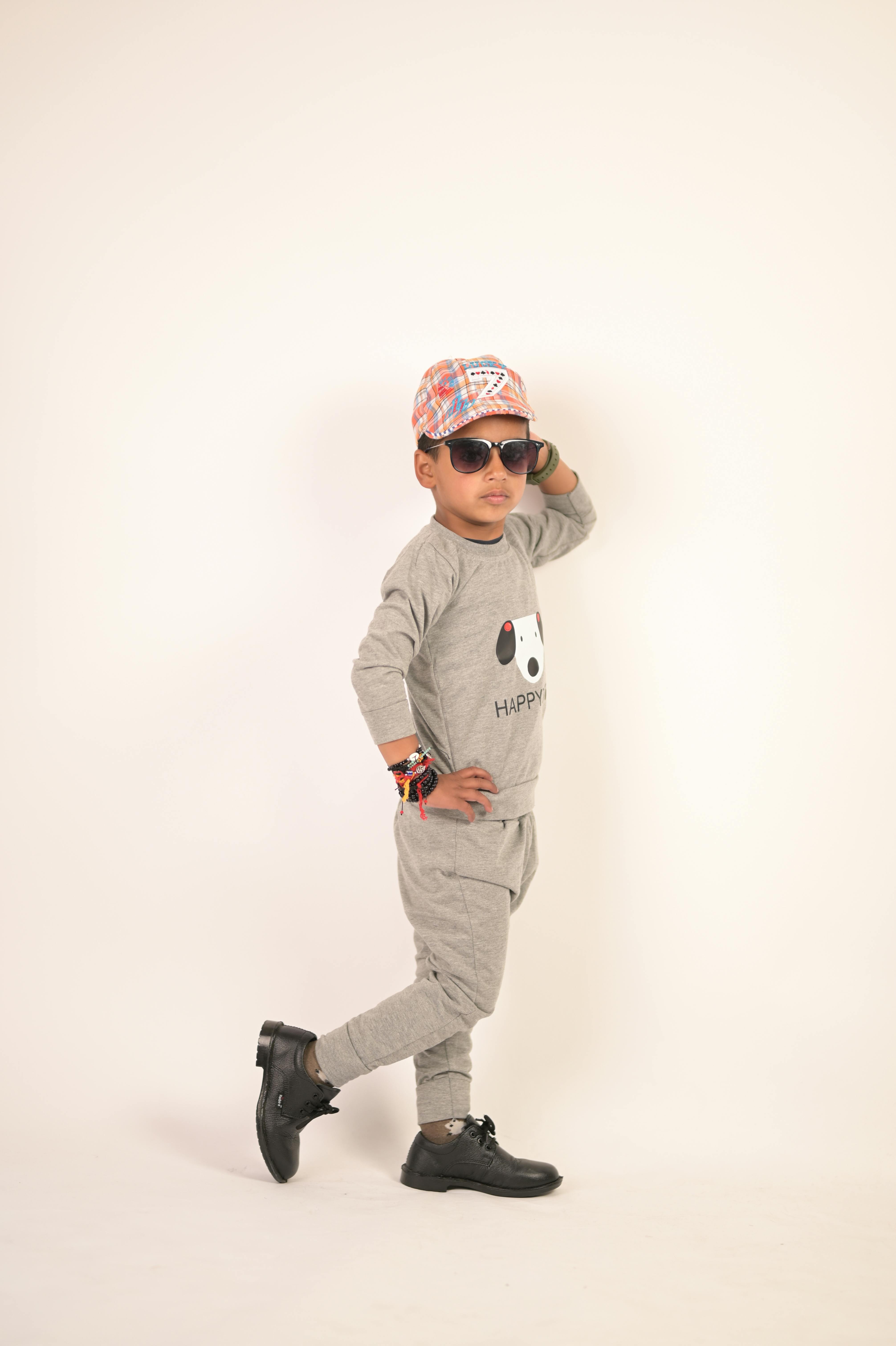 Little Boy Wearing Cap and Sunglasses · Free Stock Photo