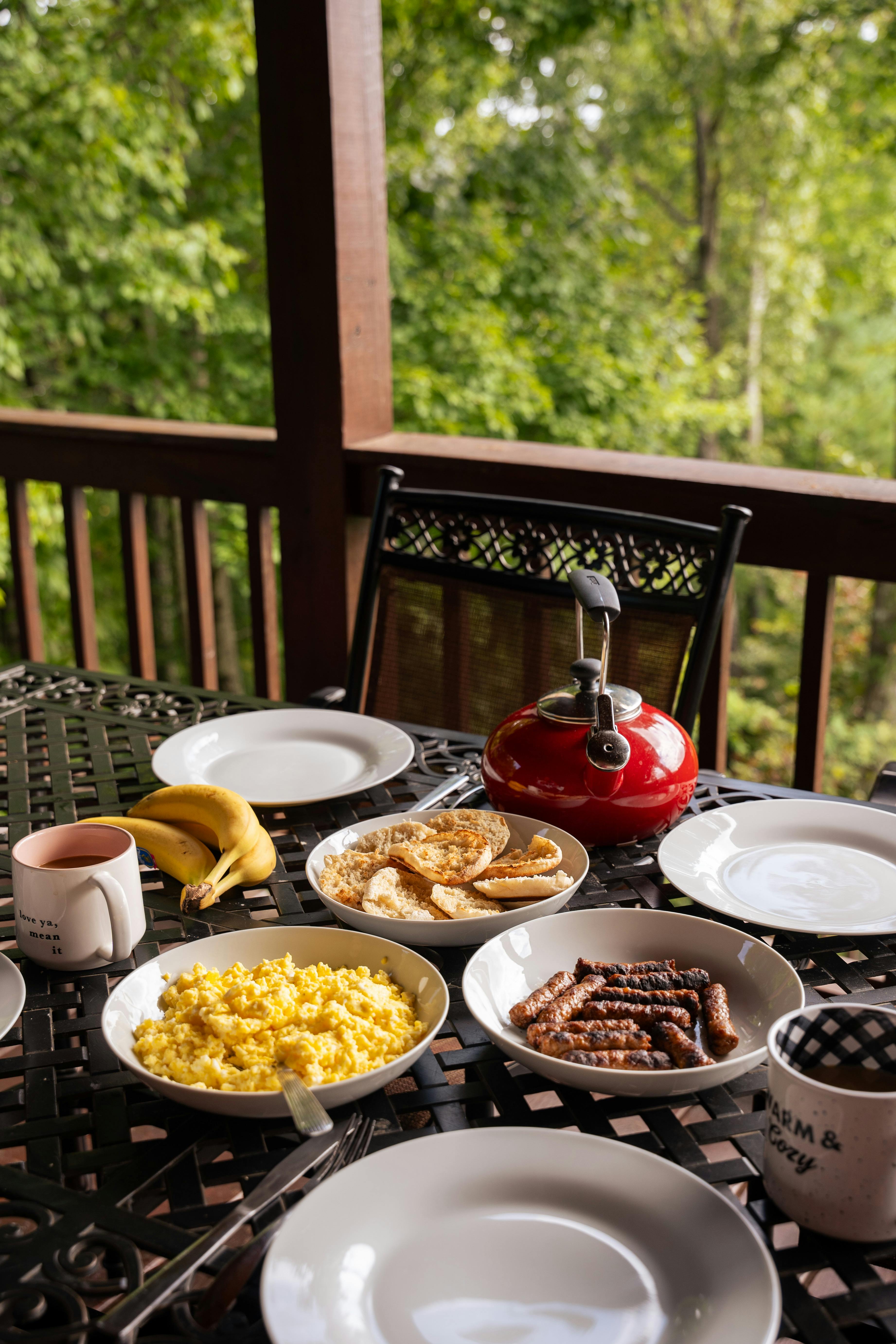 Breakfast on a Table on Patio · Free Stock Photo