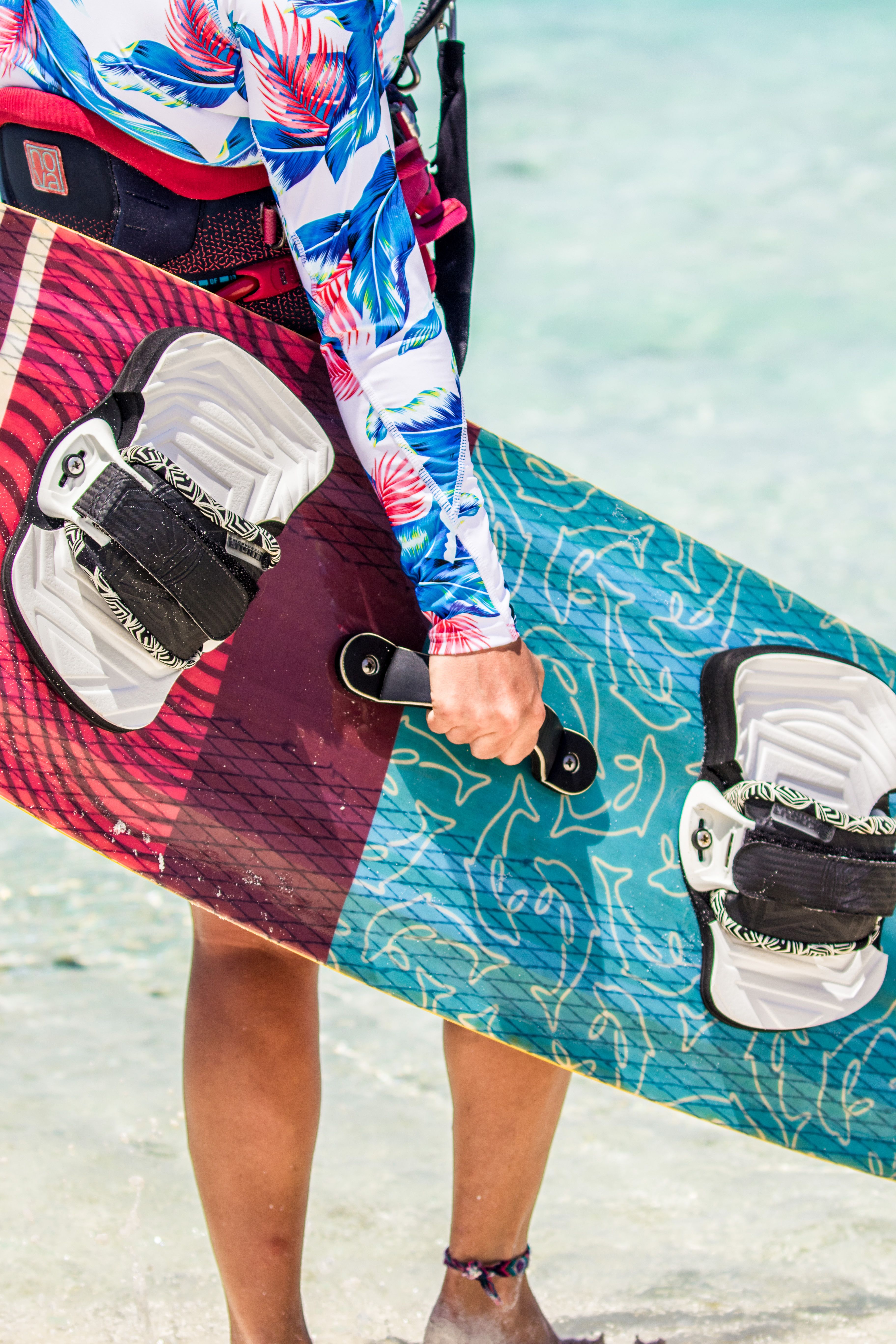 Tourist Carrying a Wakeboard on the Beach · Free Stock Photo