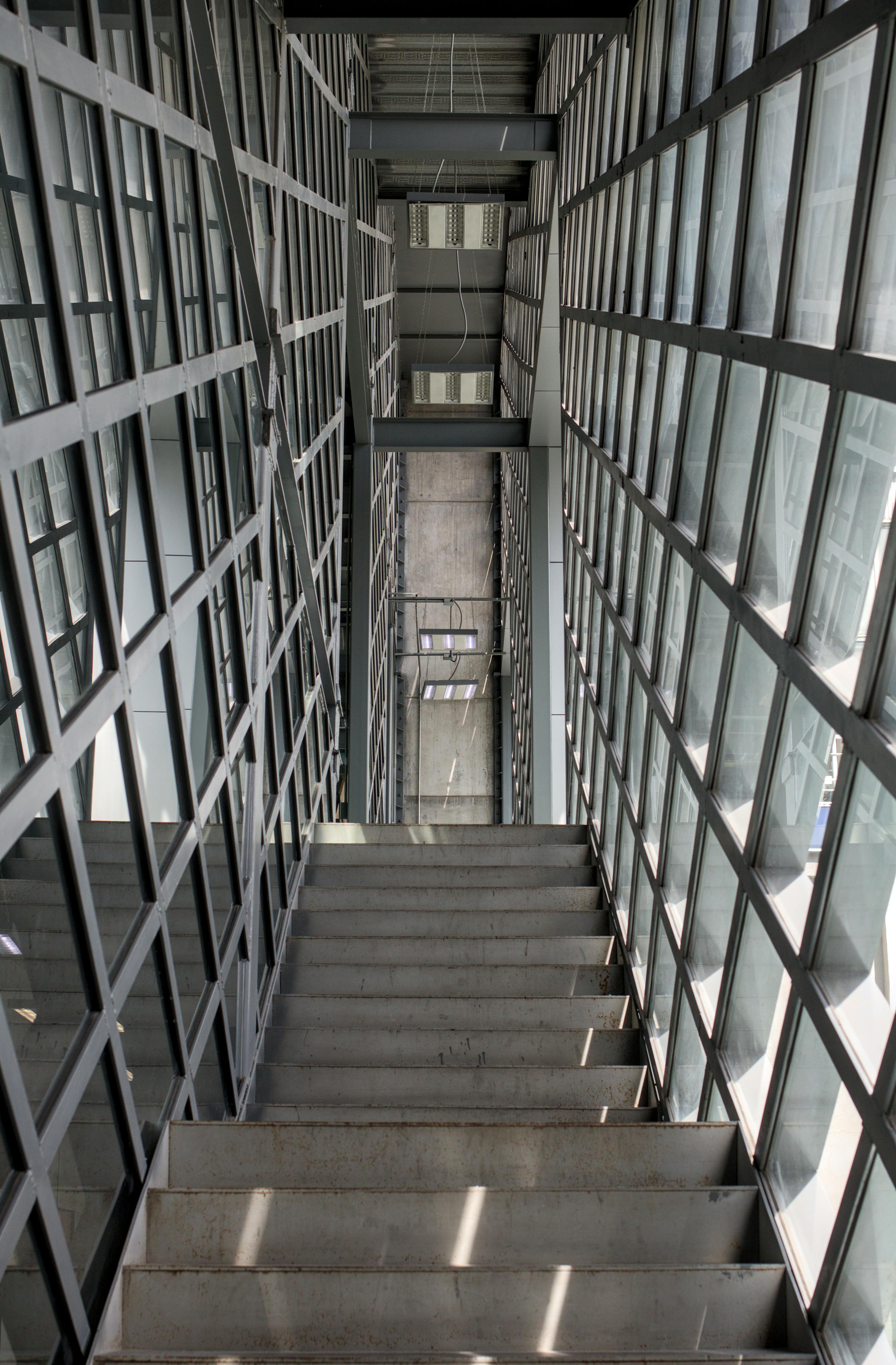High Ceiling Above Steep Stairs Between Steel Structures of Glass Walls ...