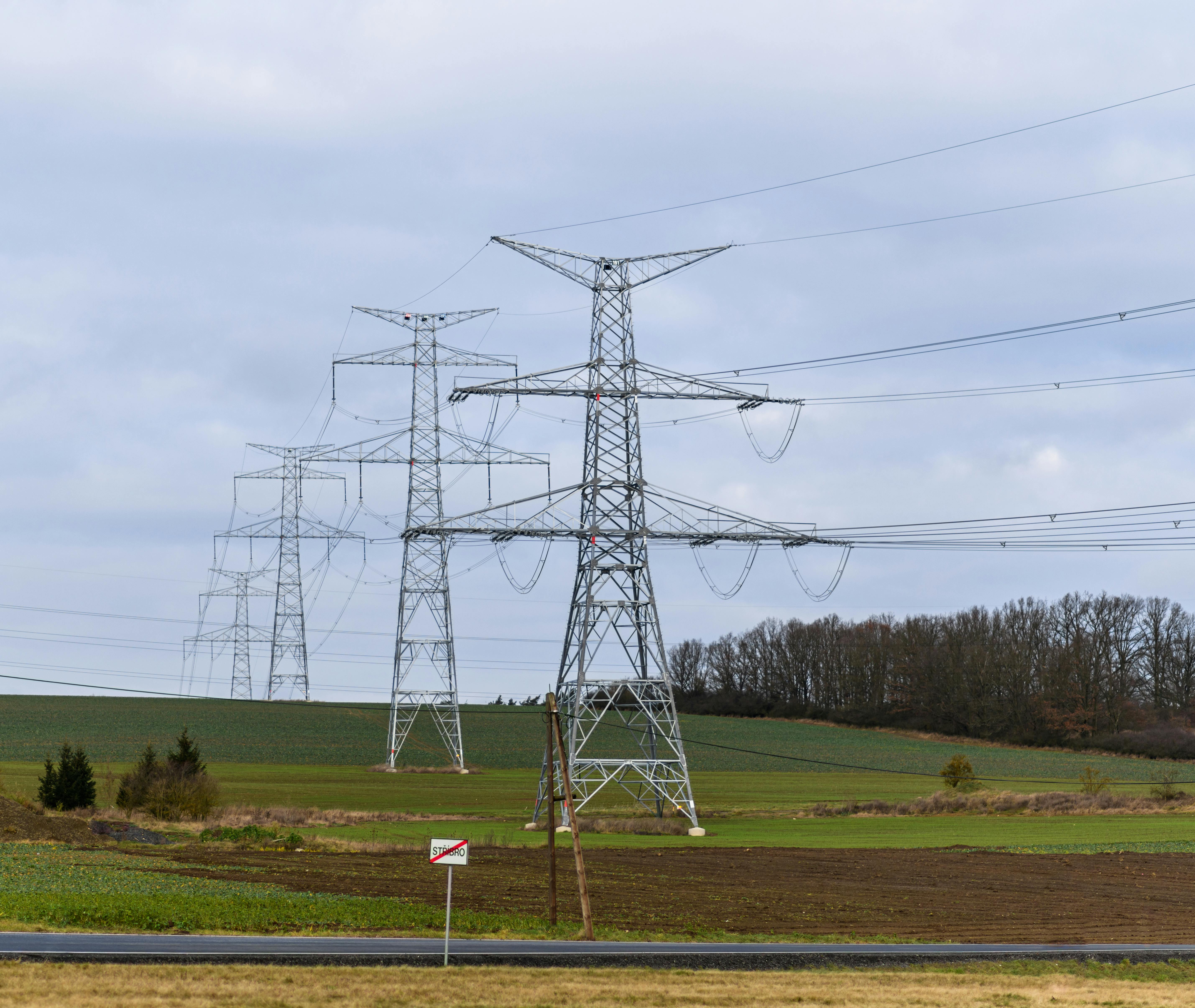 Steel Lattice Transmission Towers of High Voltage Grid on Fields · Free ...