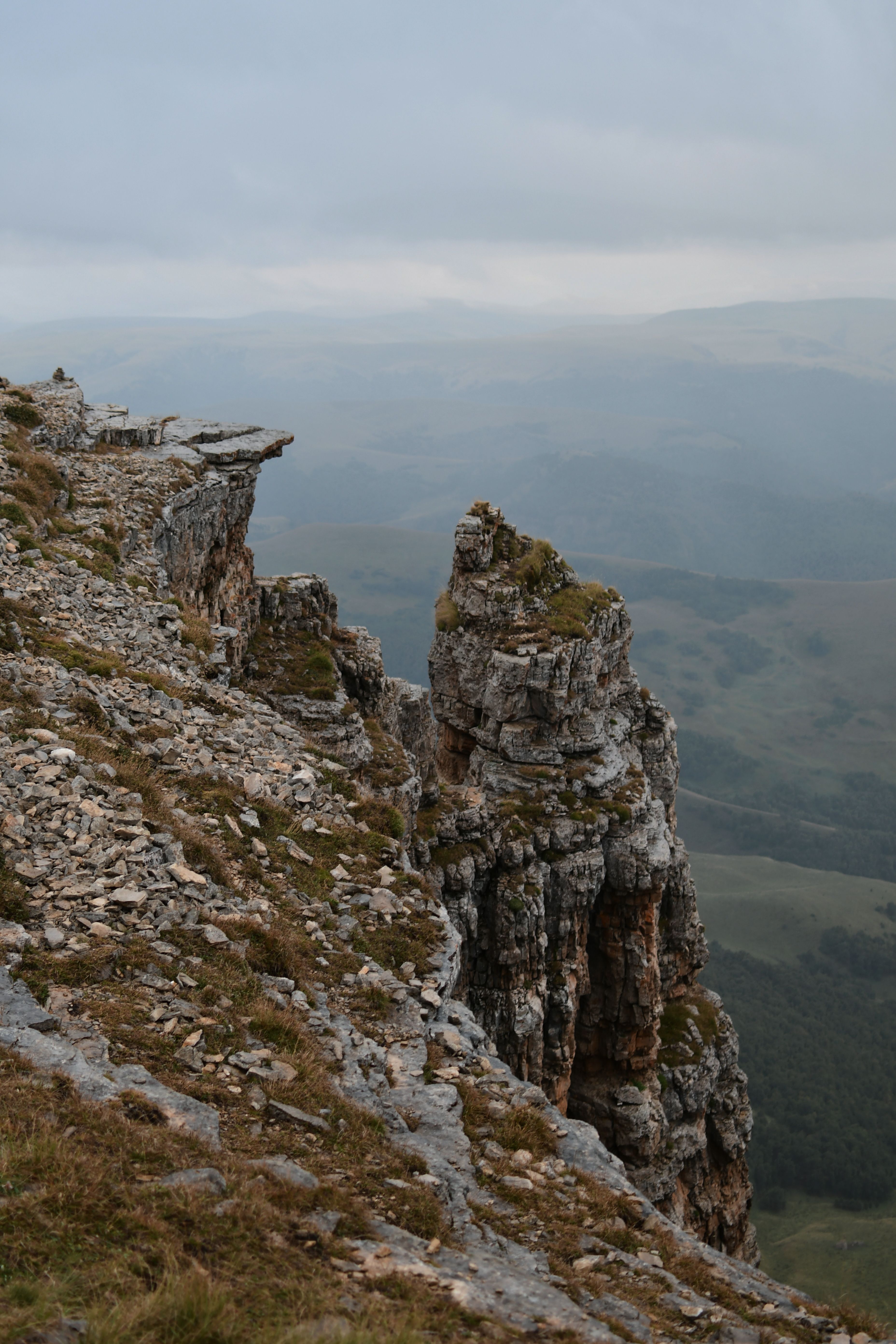 Rugged Rock Formation on a Steep Mountainside · Free Stock Photo