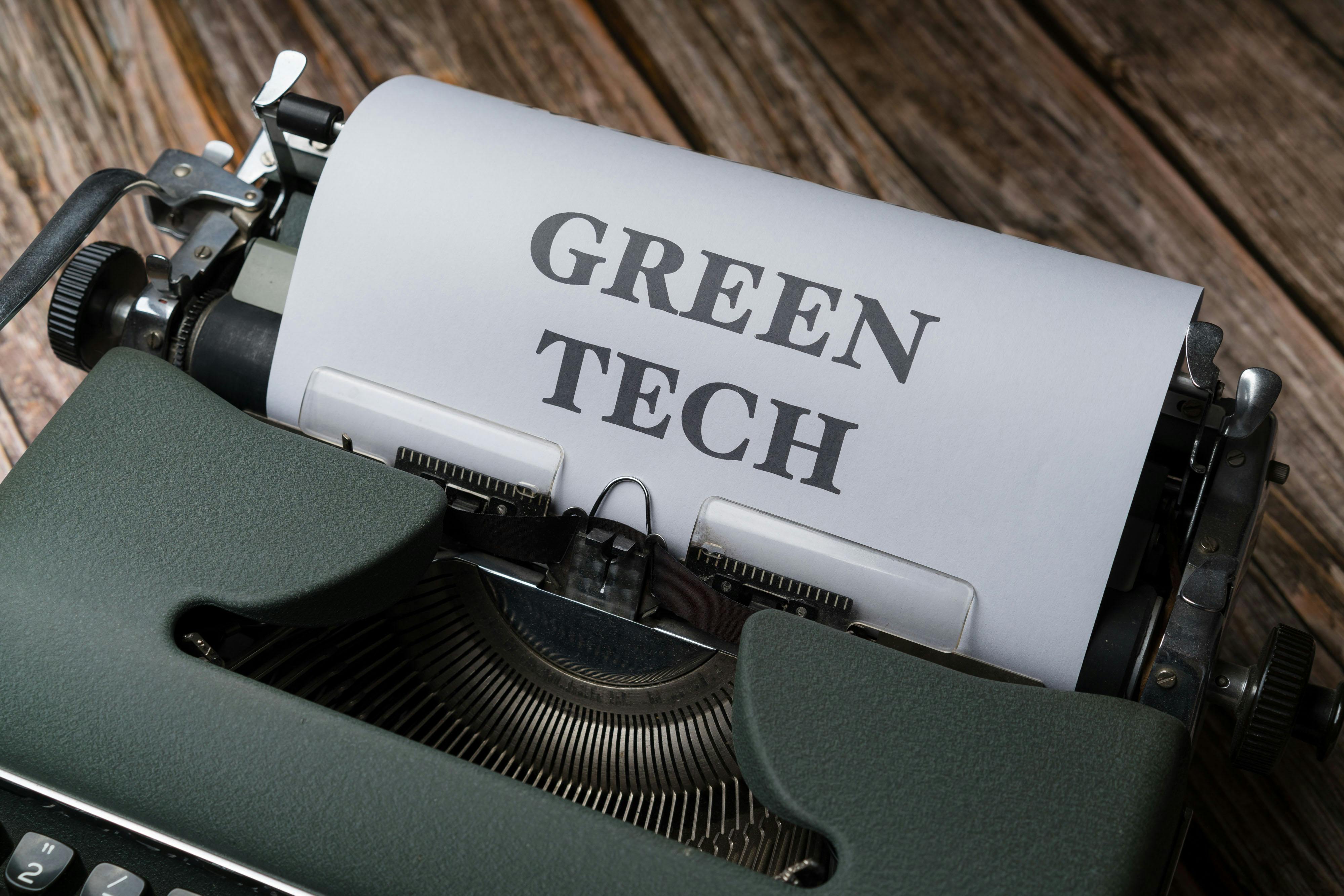 A typewriter with the words green tech on it · Free Stock Photo