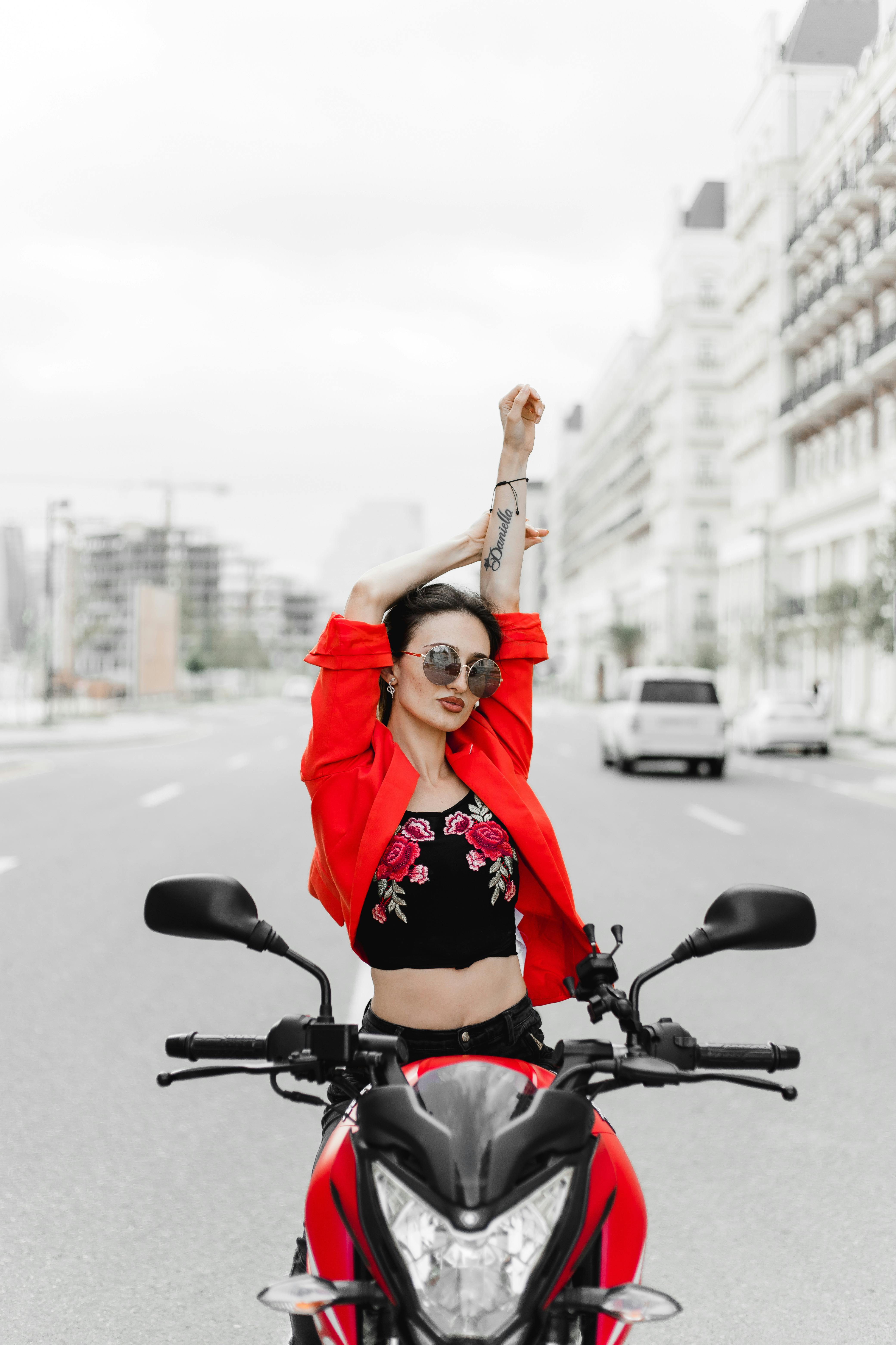 Model Posing on Motorcycle · Free Stock Photo