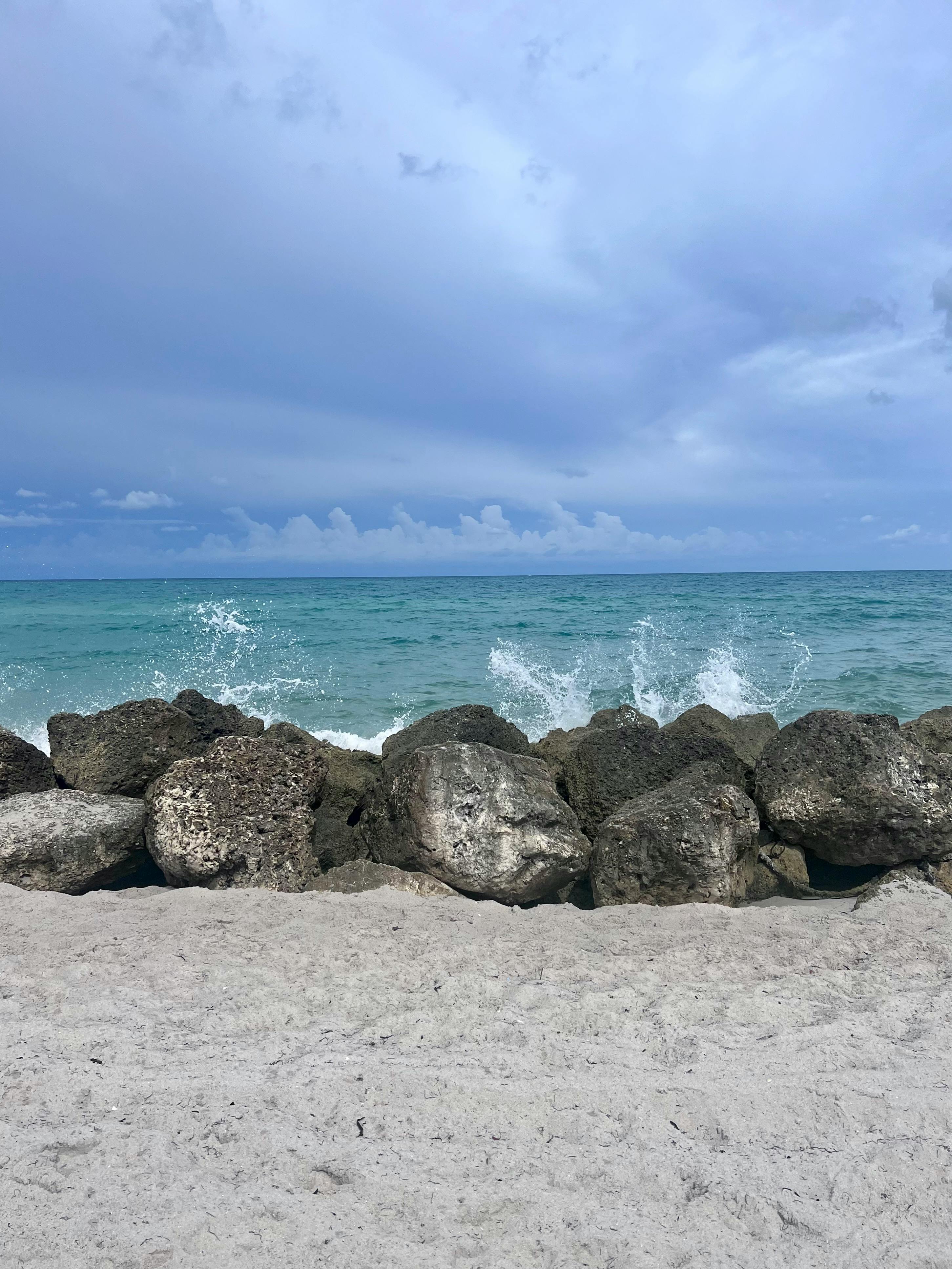 Sea Waves Splashing against Rocky Shore · Free Stock Photo