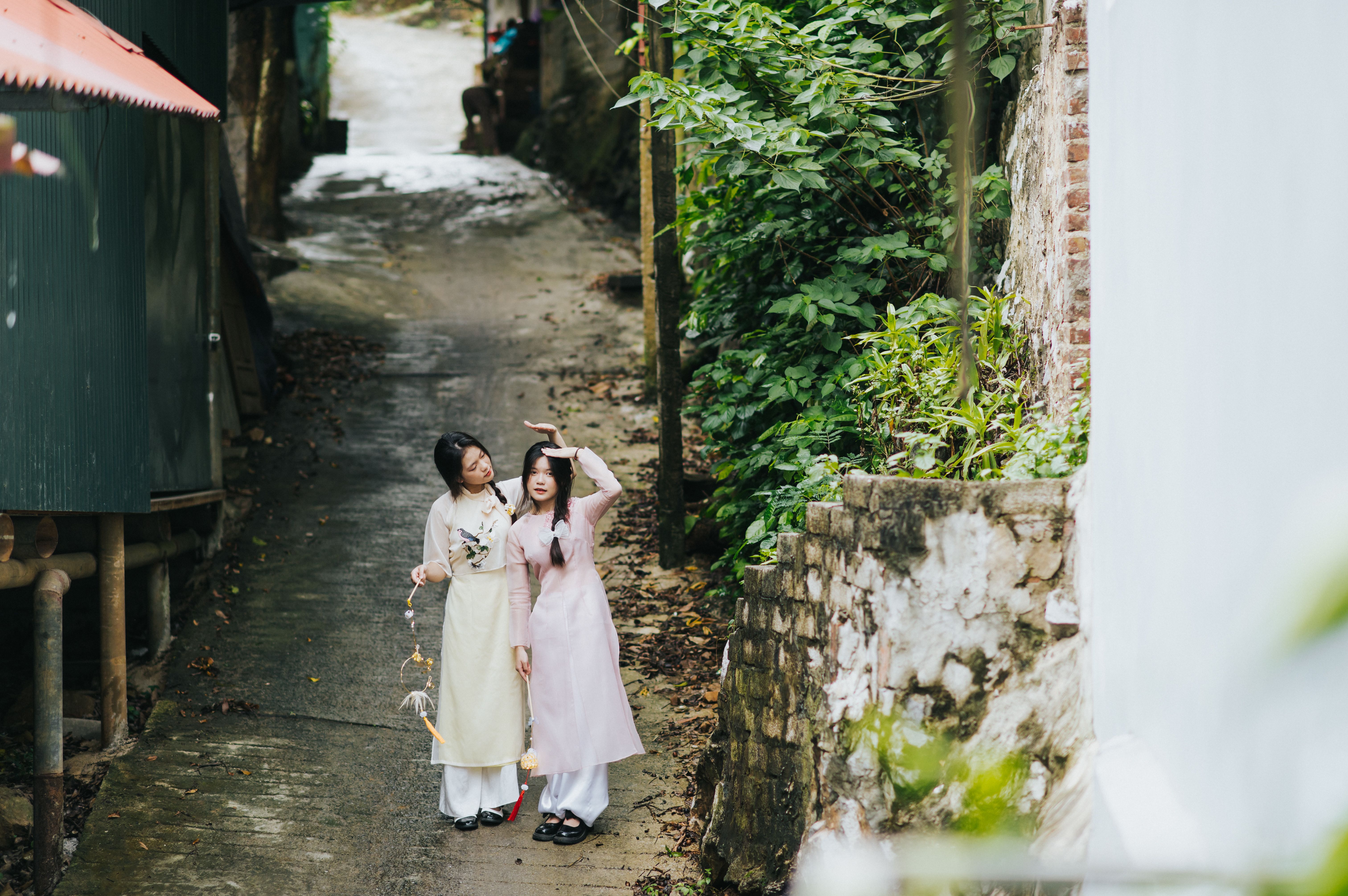 Women in Traditional Dresses on Street in Village · Free Stock Photo