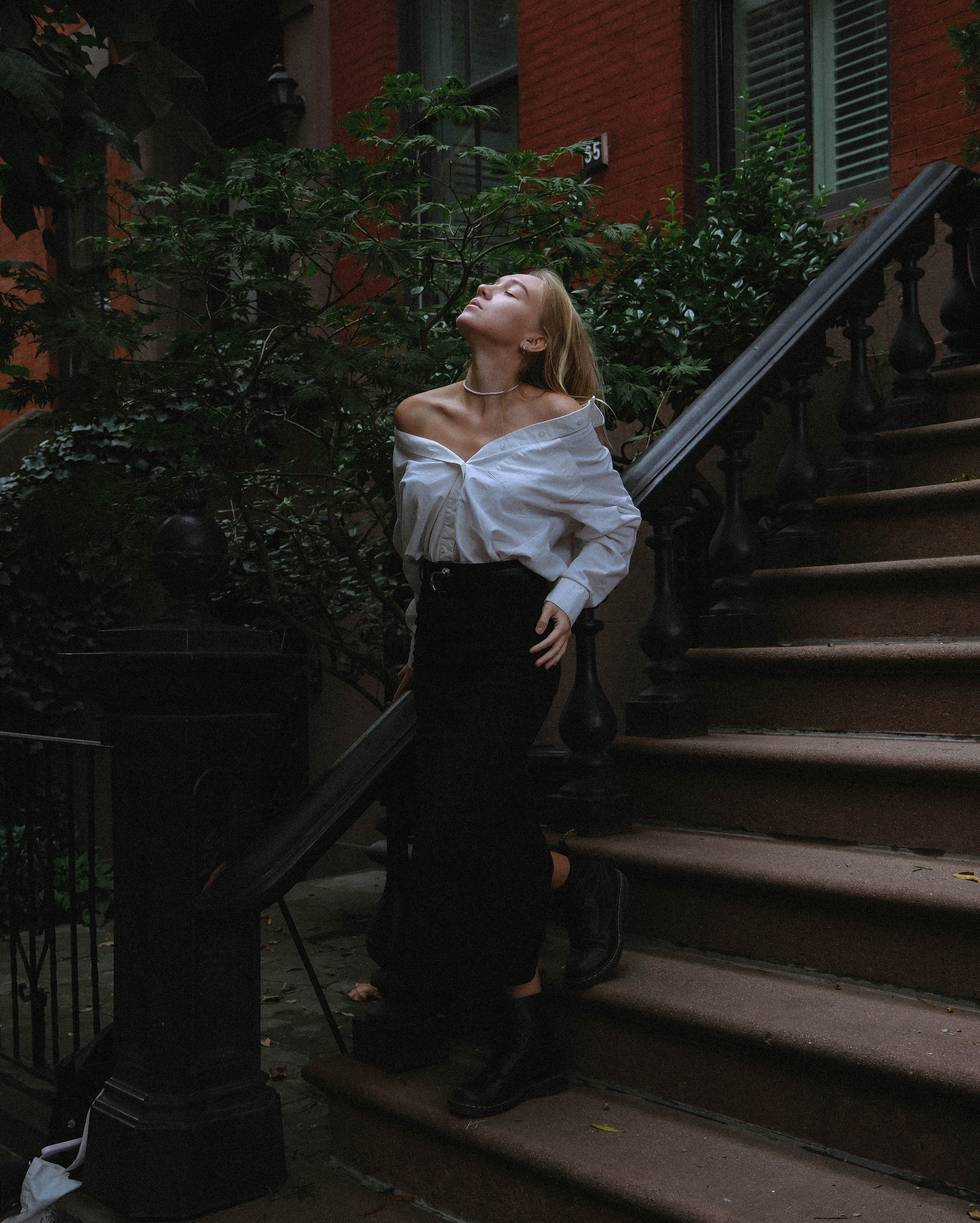 Cute Woman Standing on the Stairs · Free Stock Photo