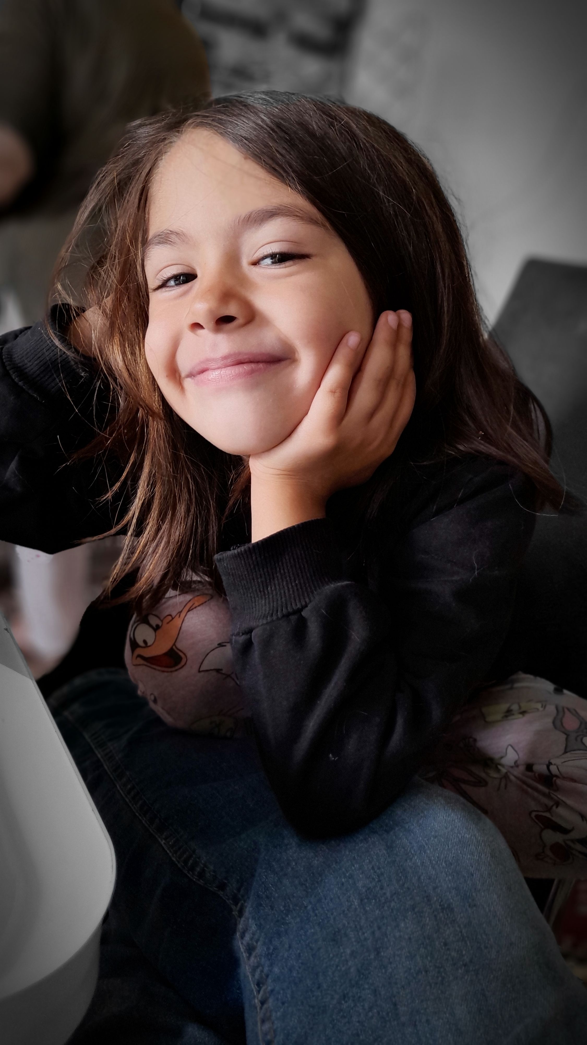 Smiling Girl with Hand on Cheek · Free Stock Photo