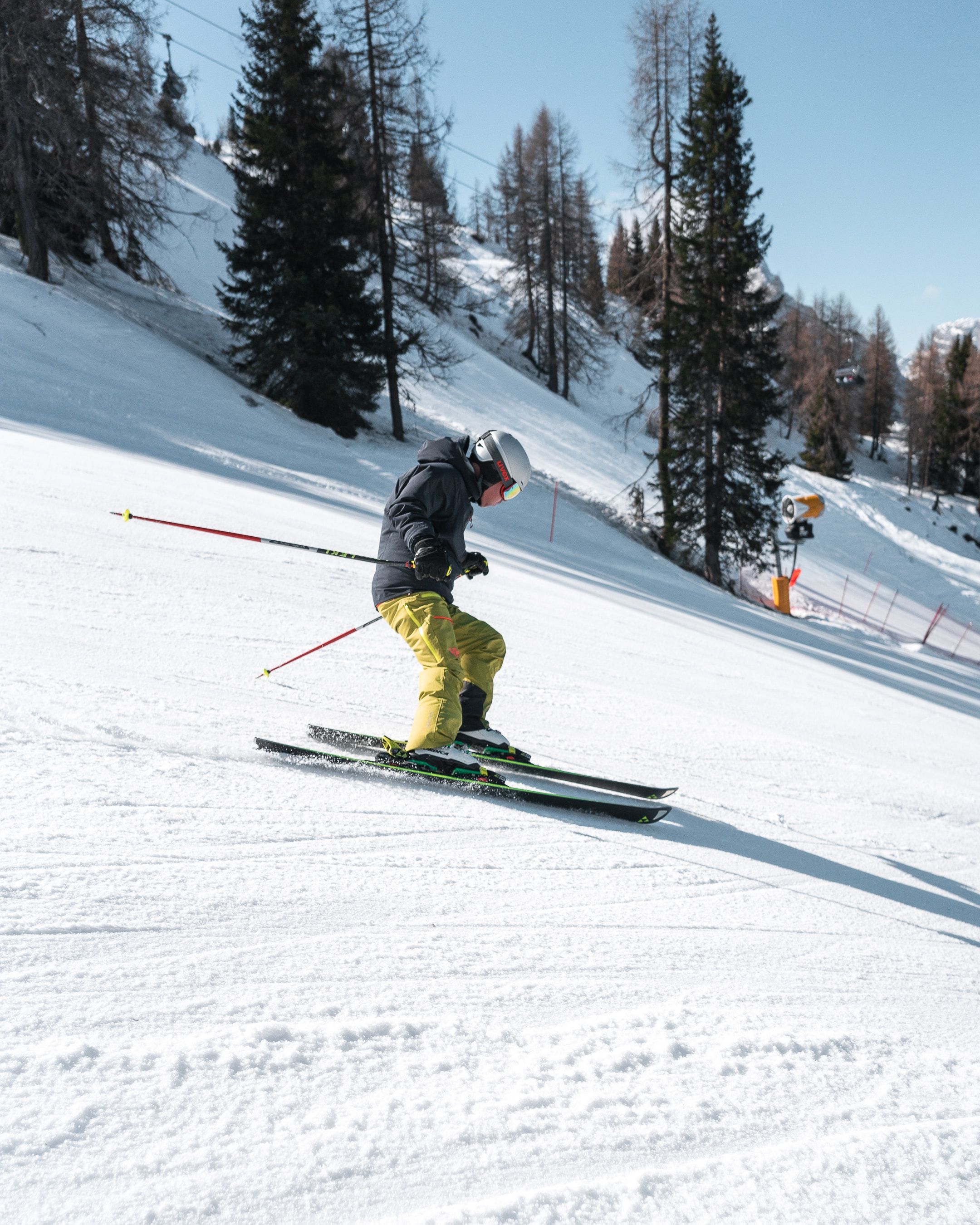 Man Doing Ice Skiing on Snow Field in Shallow Focus Photography · Free ...