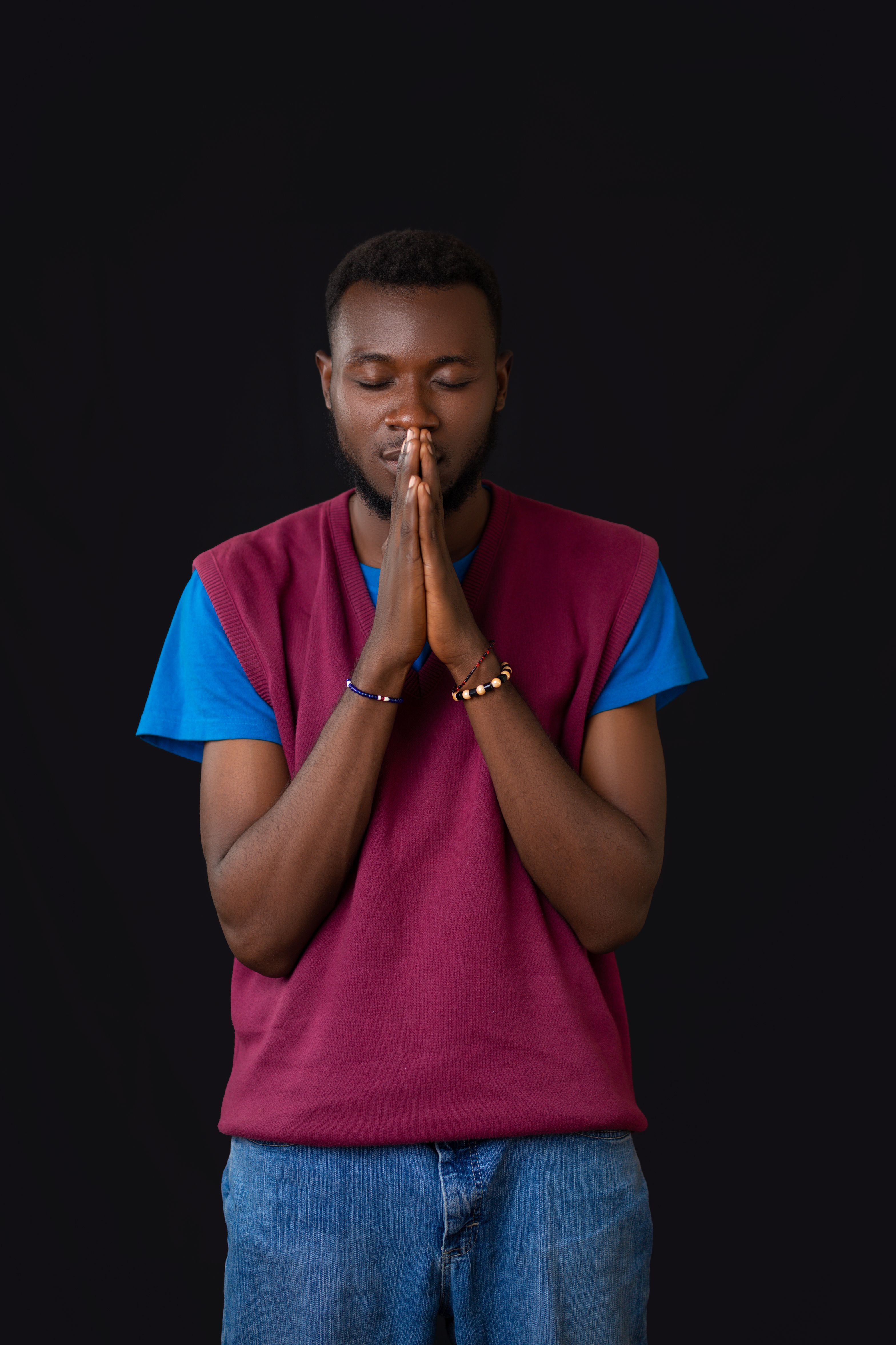 Young Man Praying · Free Stock Photo