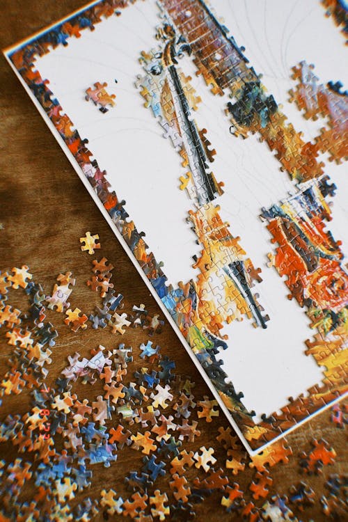 Partly Assembled Pieces of a Jigsaw Puzzle · Free Stock Photo Partly Assembled Pieces of a Jigsaw Puzzle · Free Stock Photo