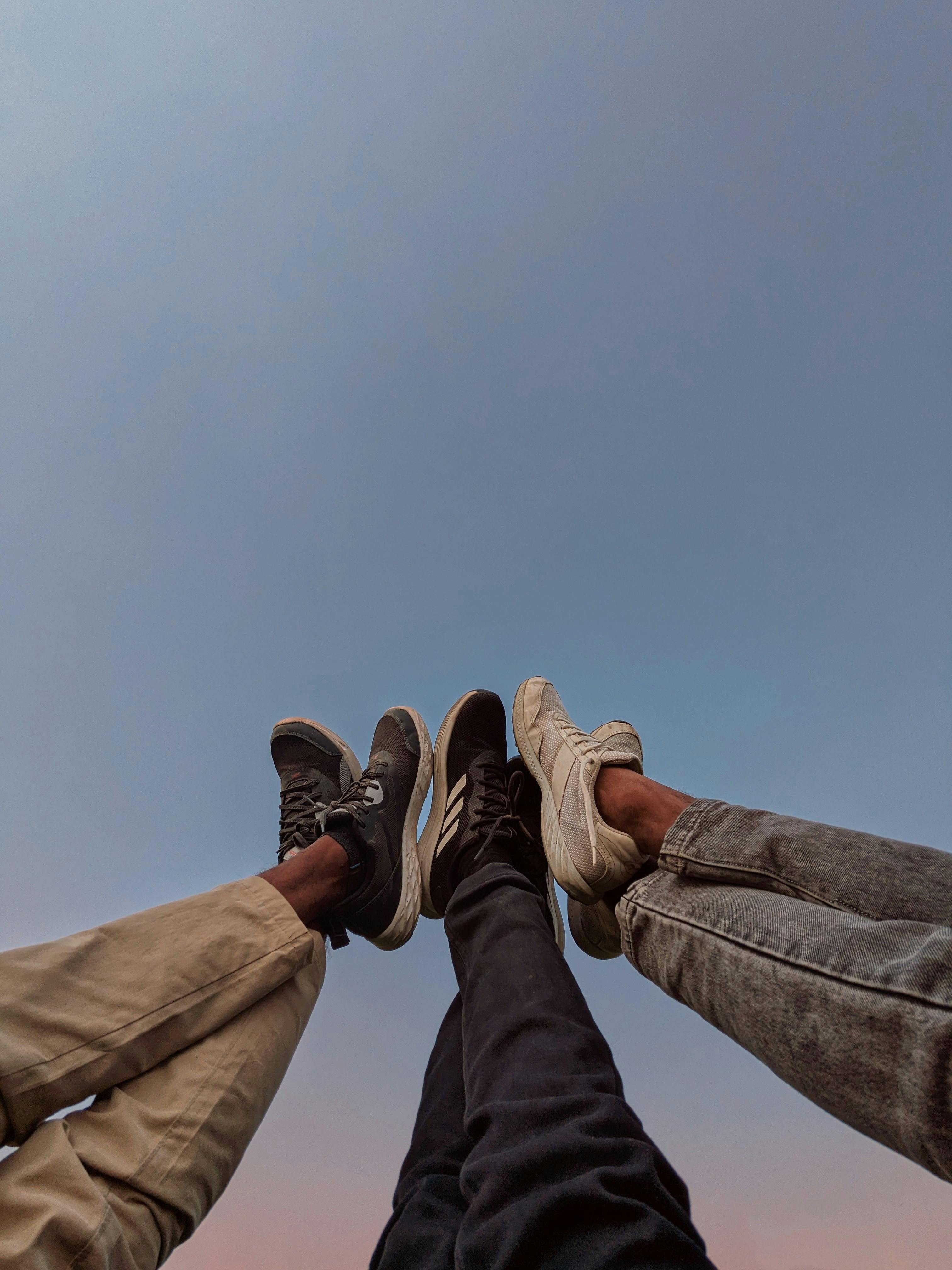 Legs of Three People · Free Stock Photo