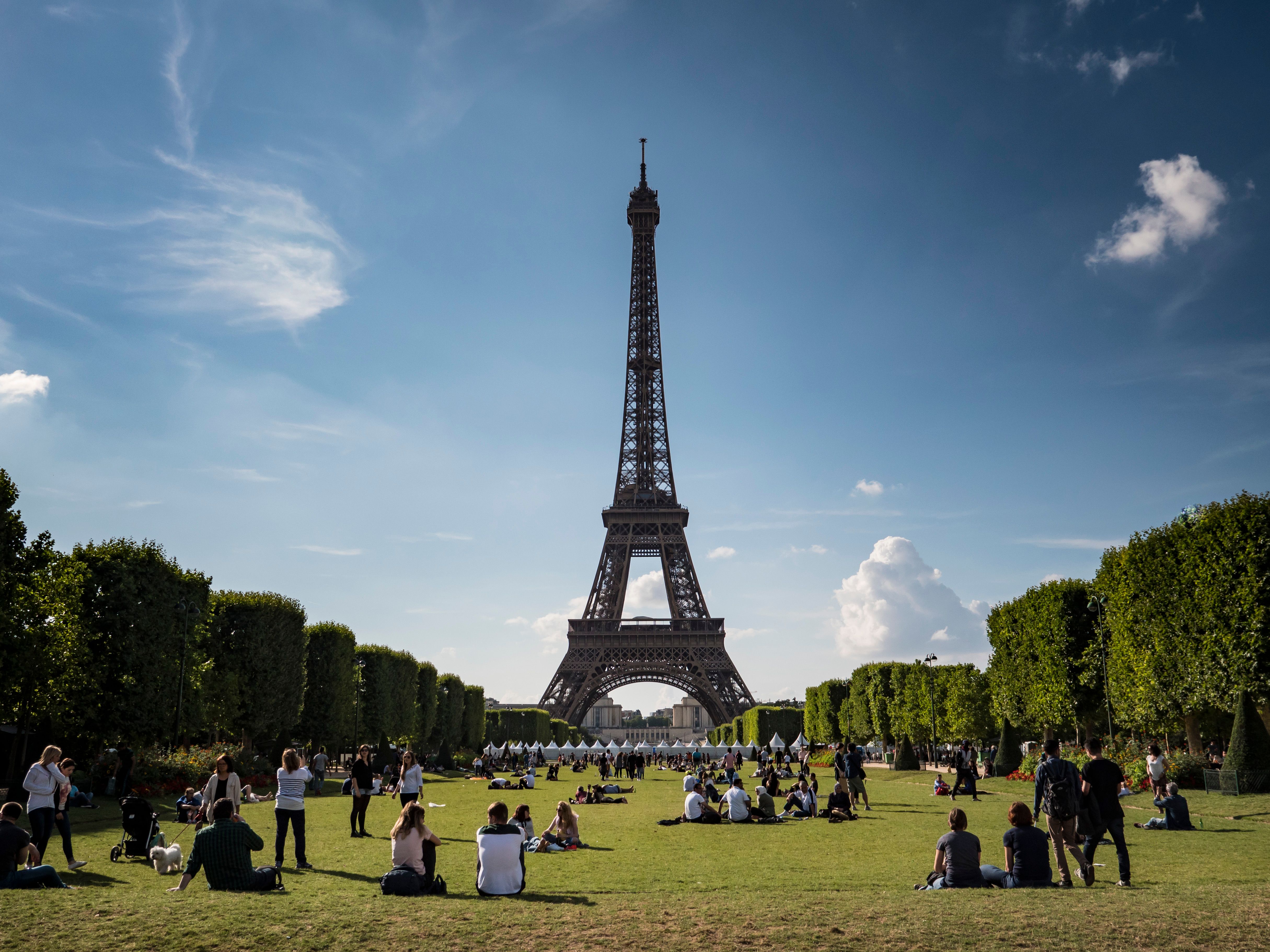 Eiffel Tower Seen Through Lush Summer Greenery, Paris, France · Free ...