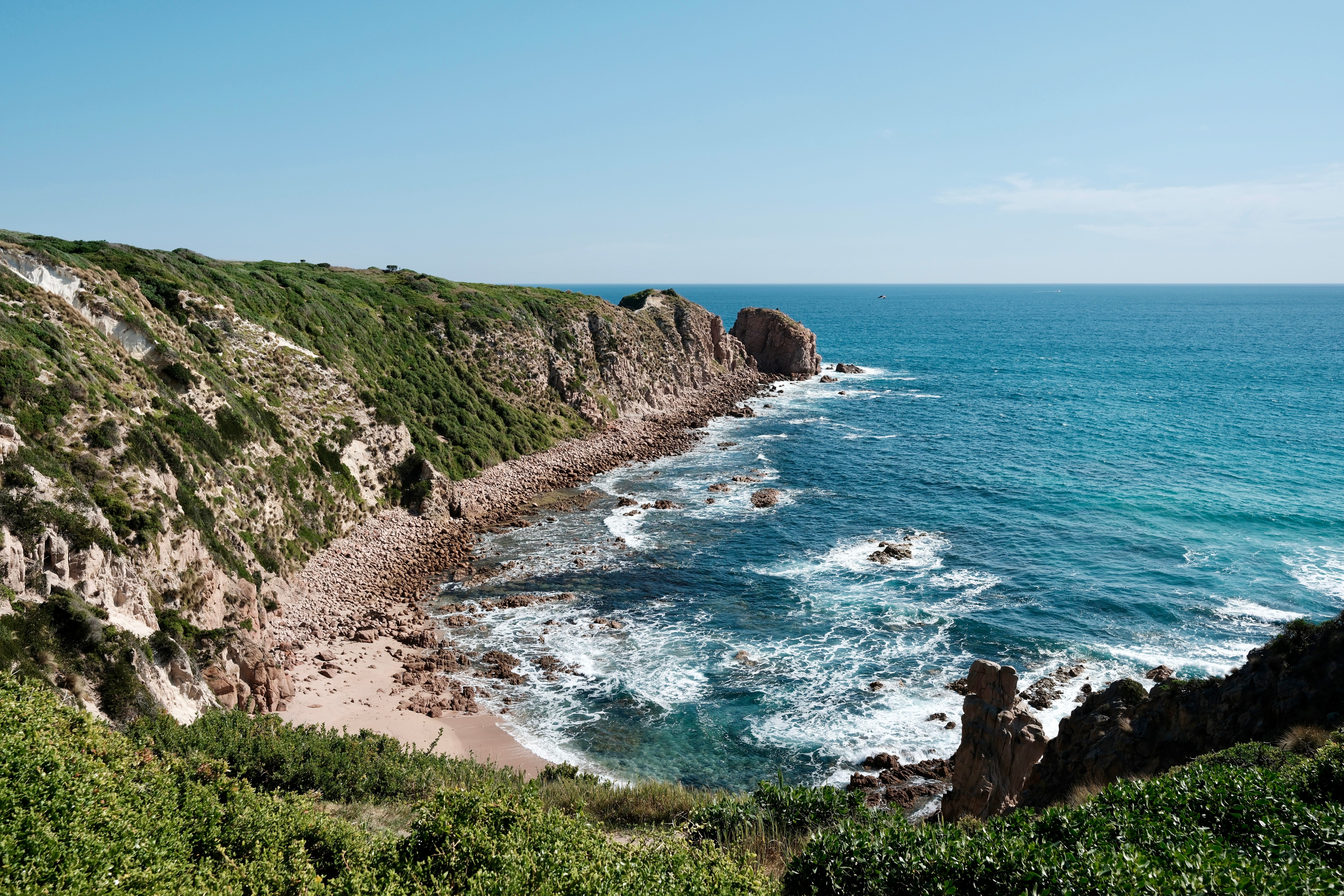 Hill around Bay on Sea Shore · Free Stock Photo