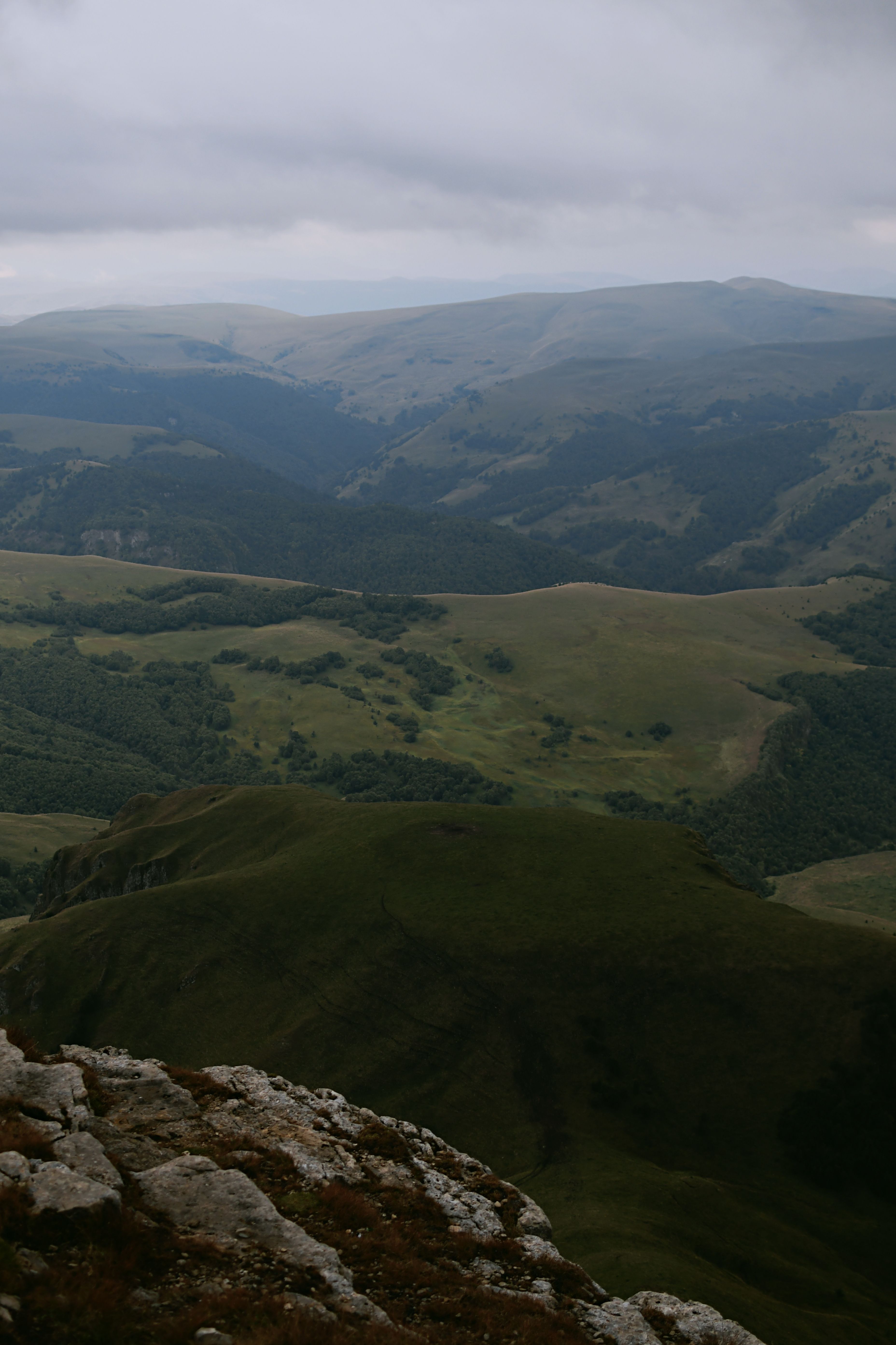 A view of a mountain range with a valley in the background · Free Stock ...
