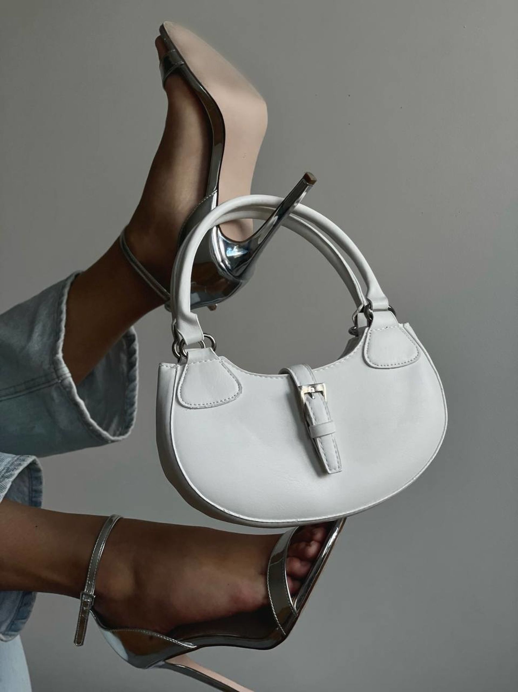 Display of Elegant White Leather Purse and Heel · Free Stock Photo