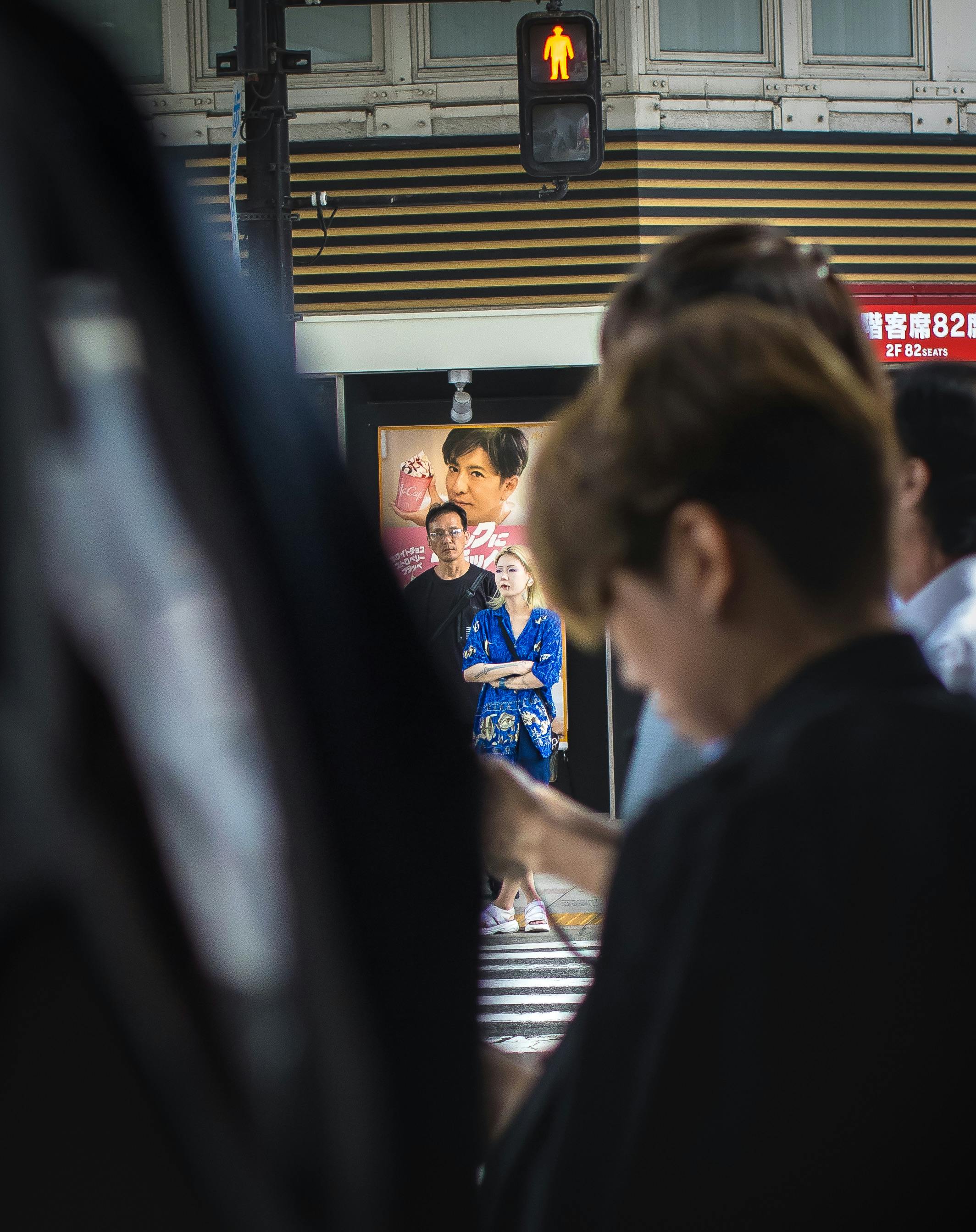 People Waiting at a Red Light Before Crossing the Street · Free Stock Photo