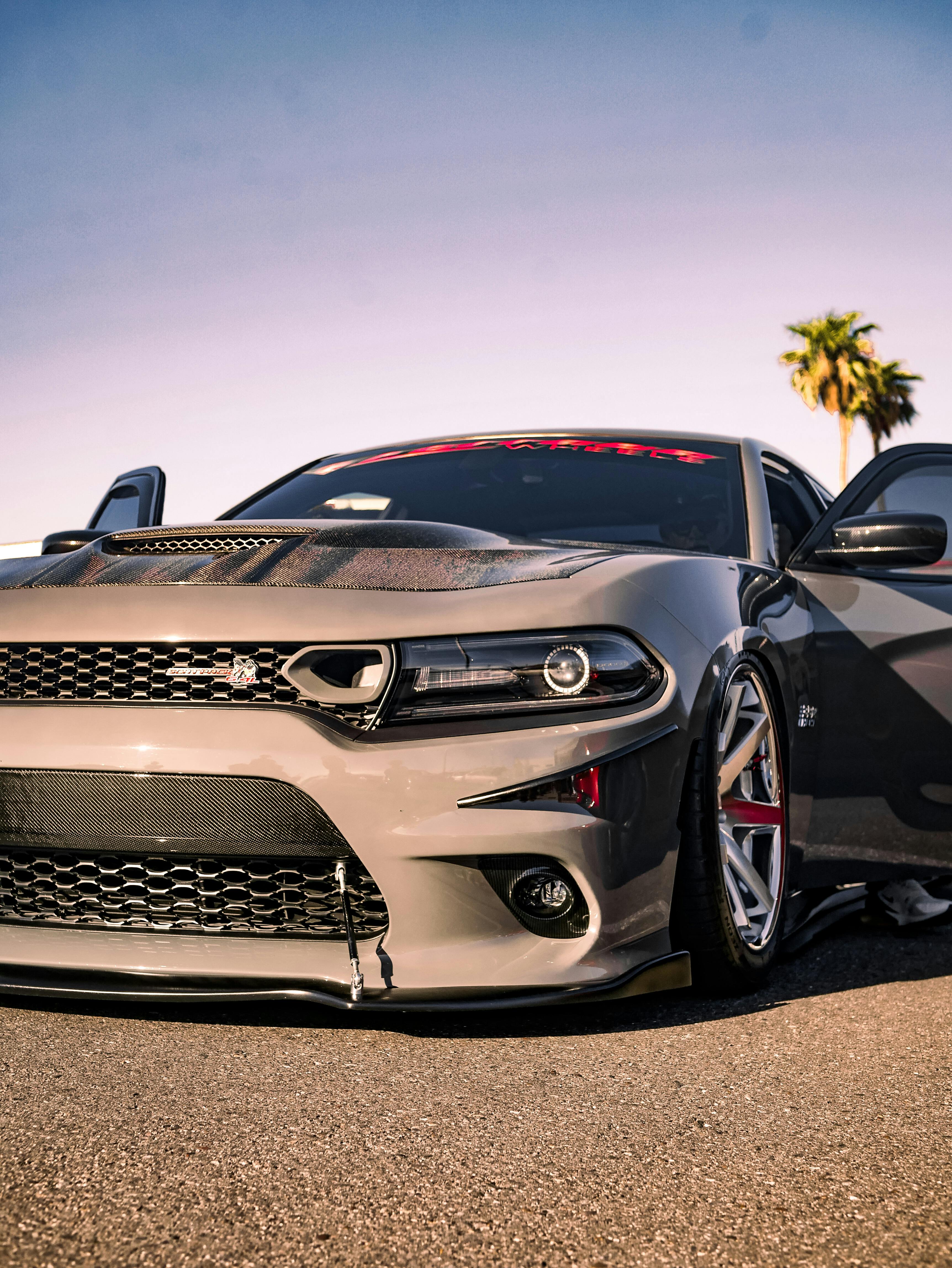 The front end of a grey dodge charger · Free Stock Photo