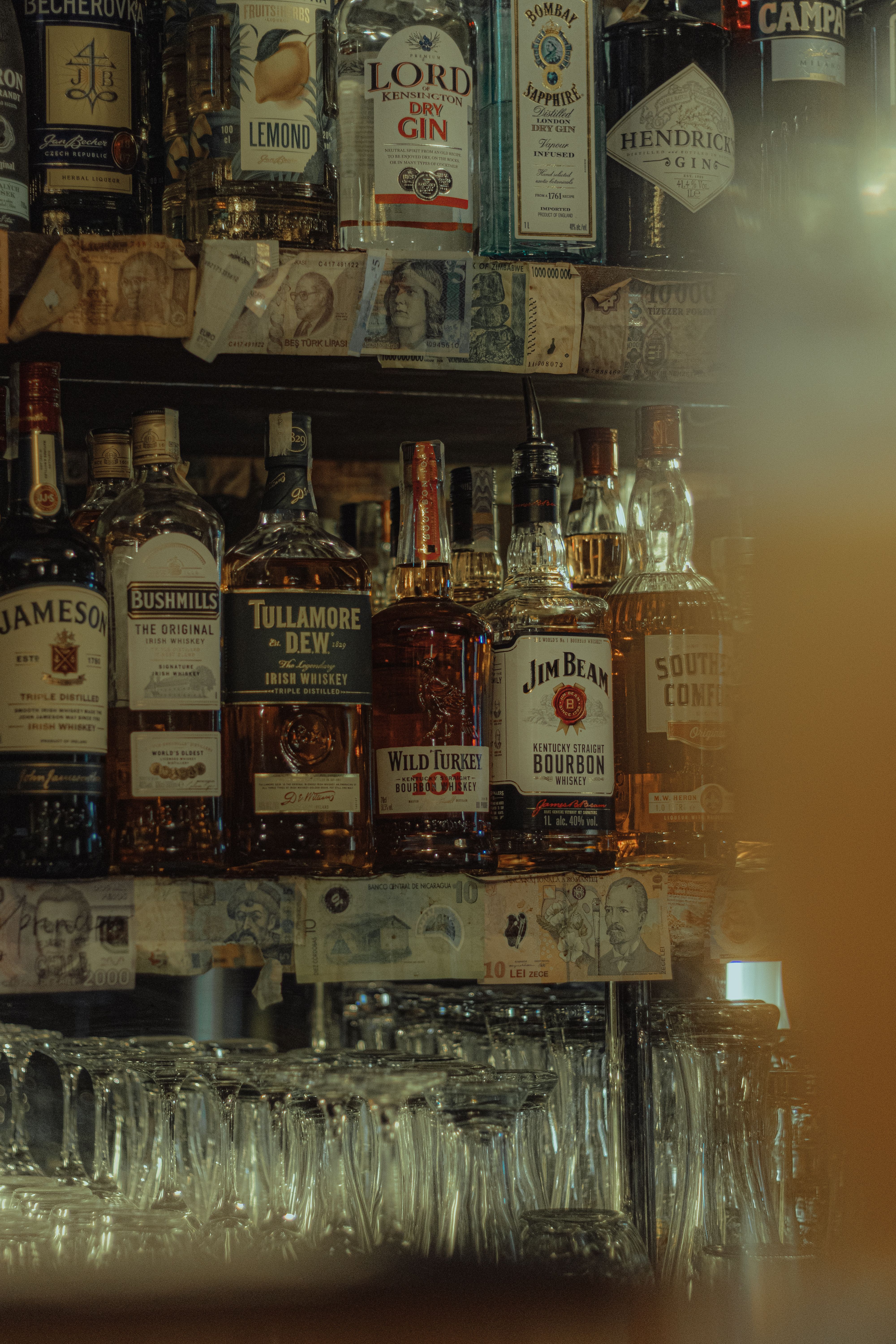 Alcohol on a Cabinet in a Restaurant · Free Stock Photo