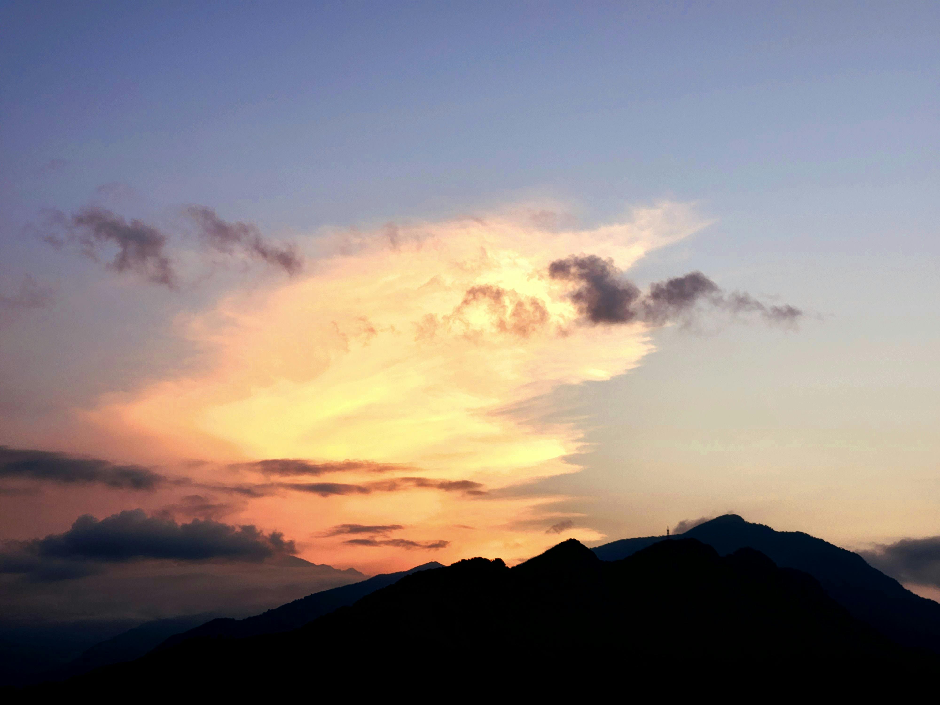 Cloud over Hills Silhouette at Sunset · Free Stock Photo