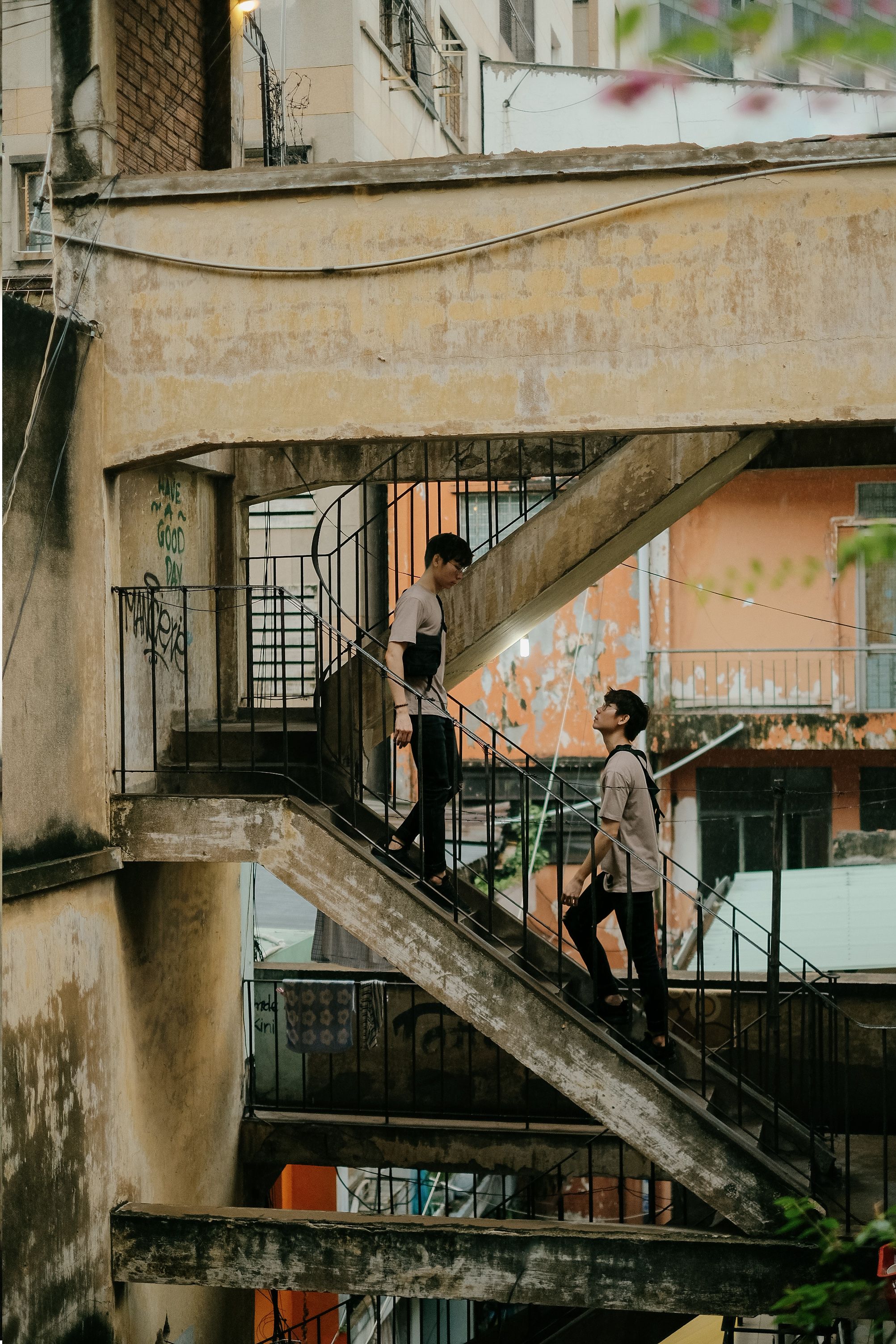 People Walking on the Exterior Stairs of a Building in City · Free ...