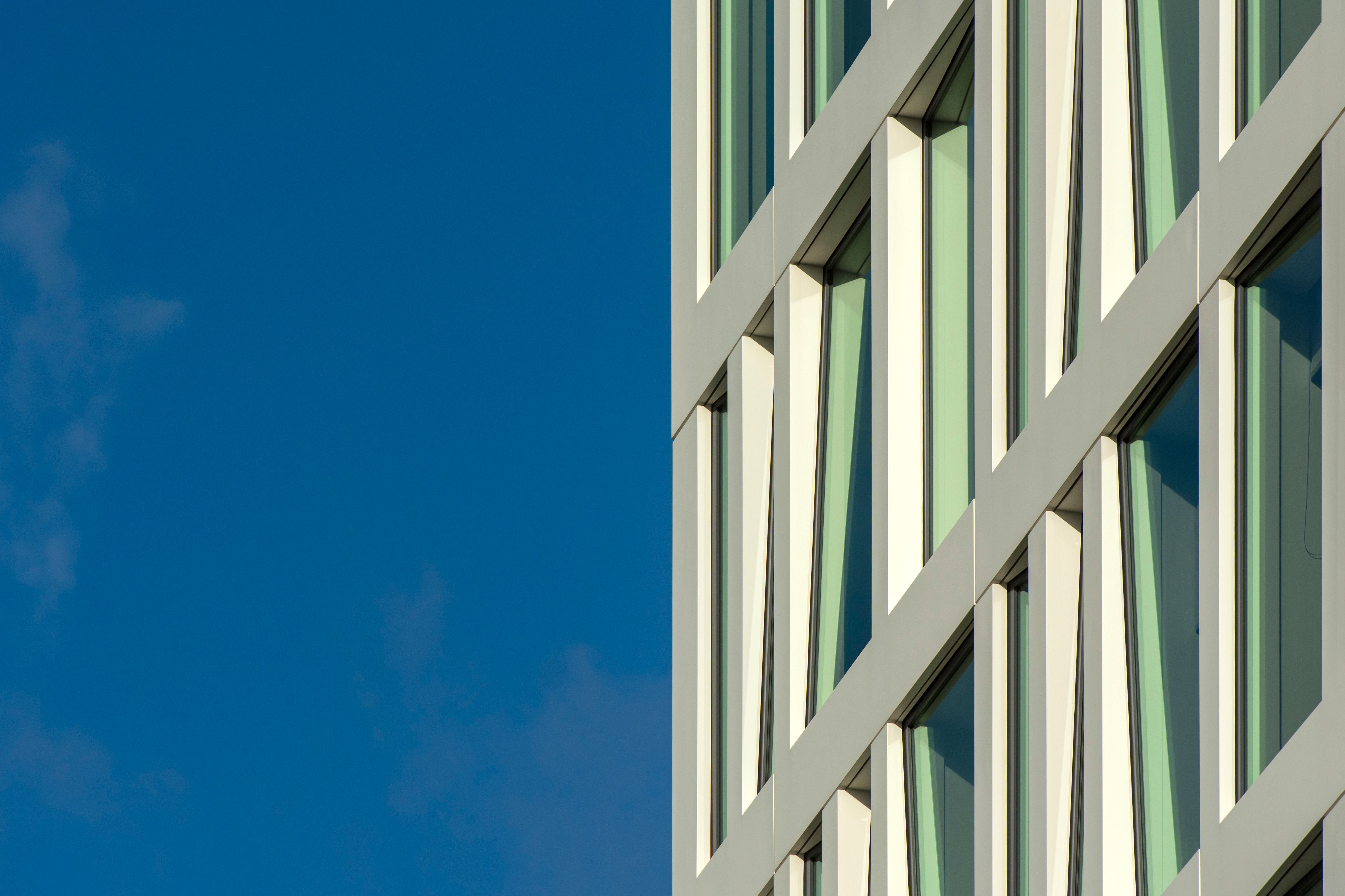 A close up of a building with windows · Free Stock Photo