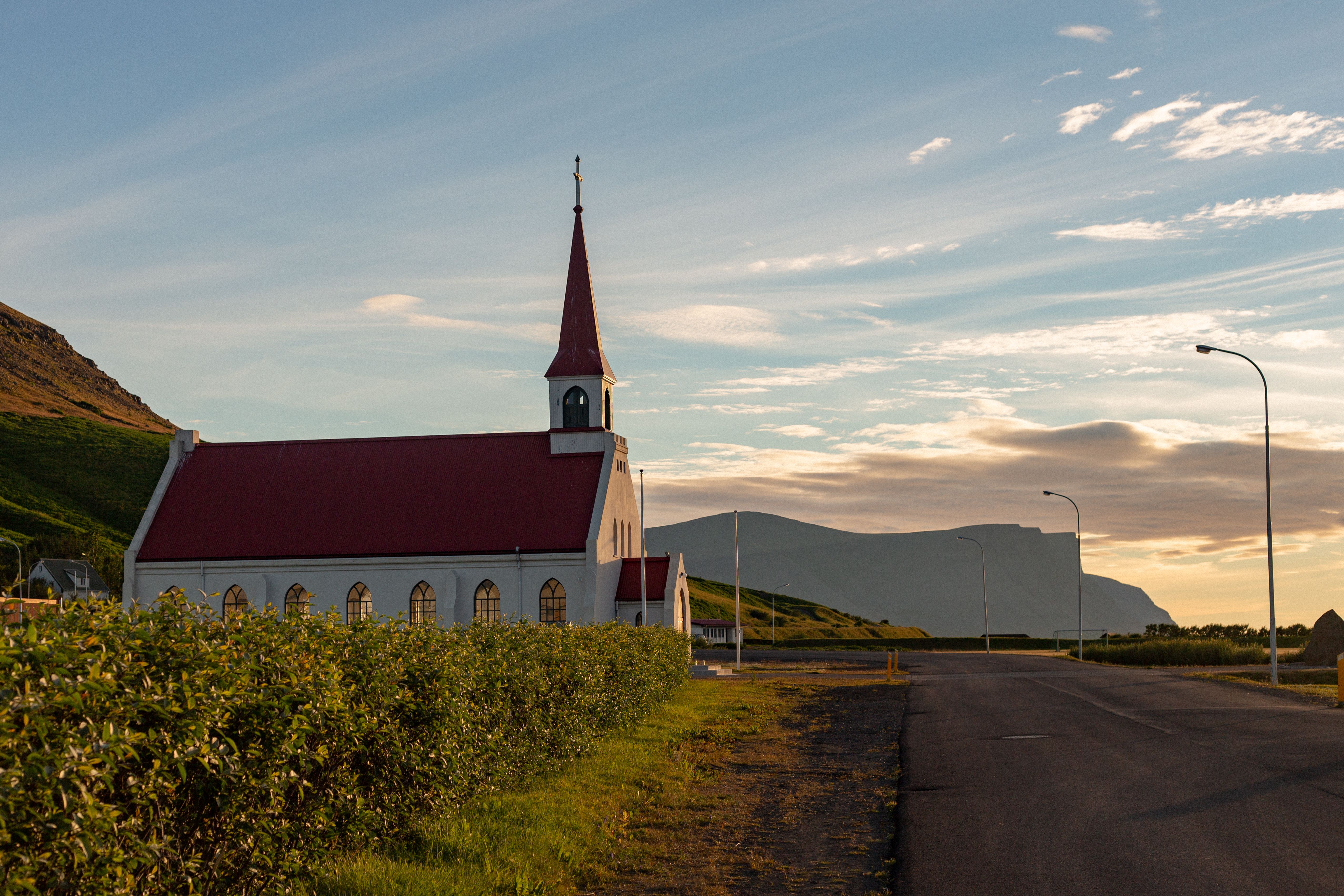 Church in a Mountain Valley During Sunset · Free Stock Photo