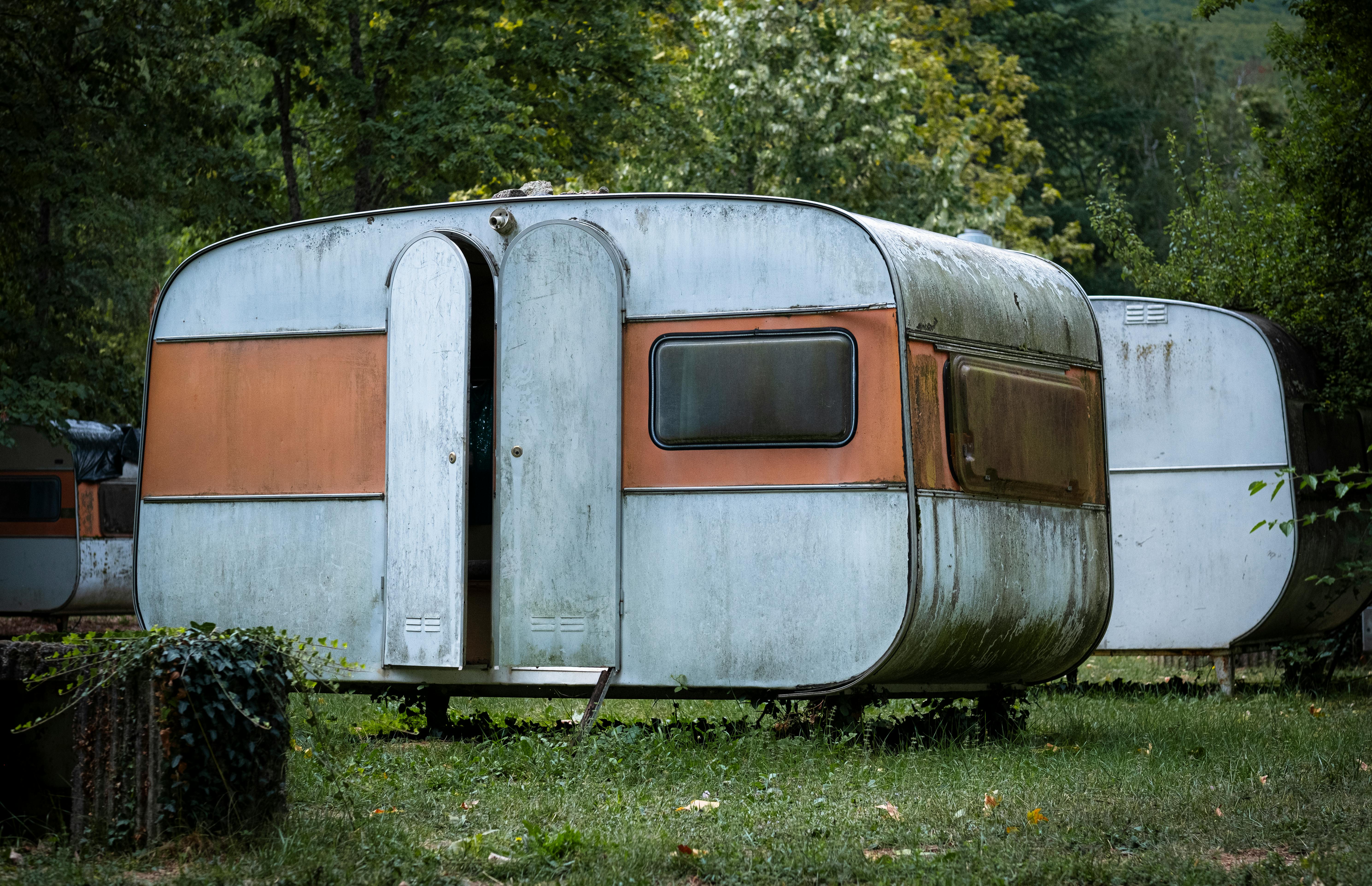 Vintage RV Cabin in Forest · Free Stock Photo