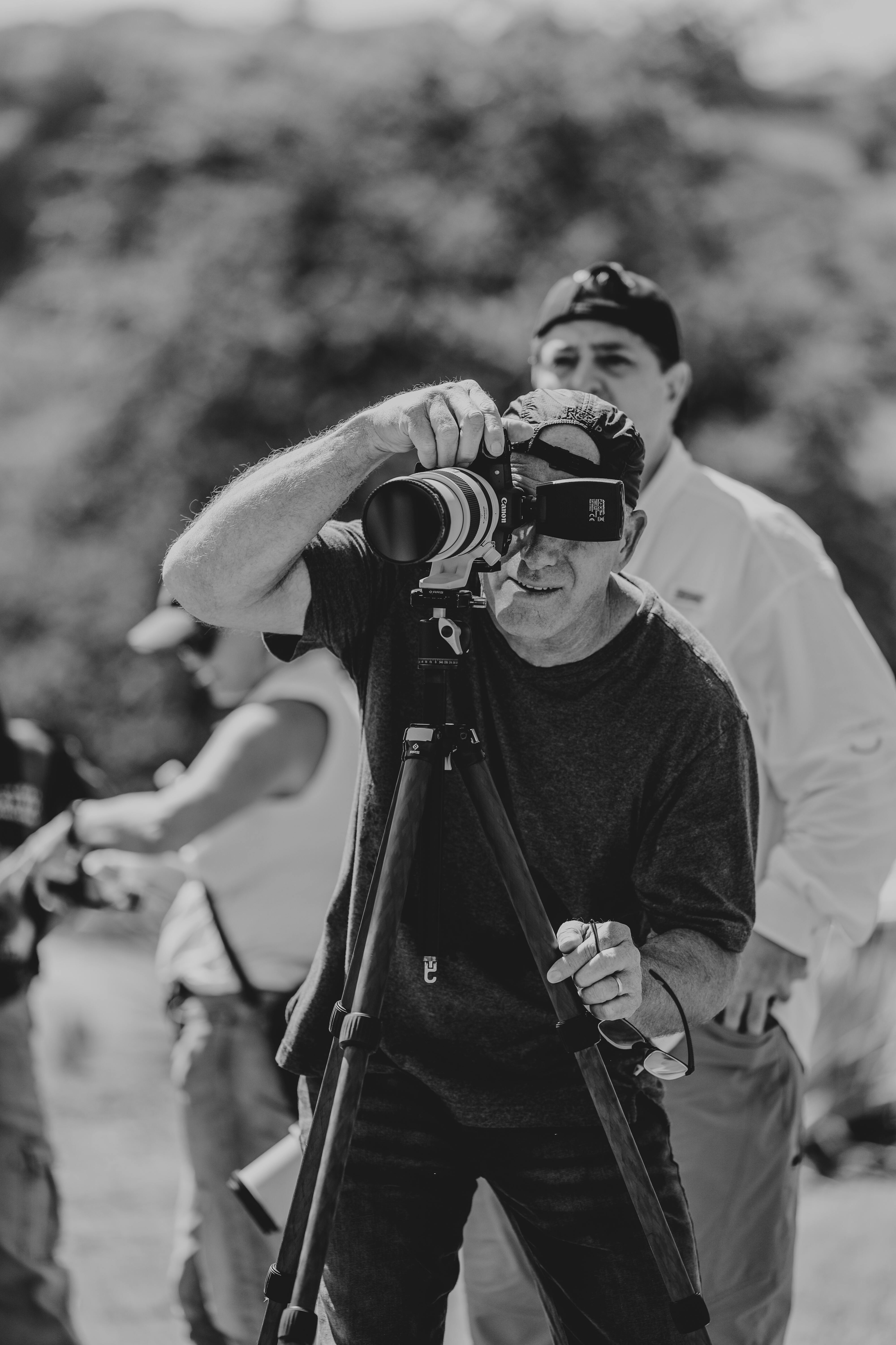 Photo of Man Using Camera · Free Stock Photo