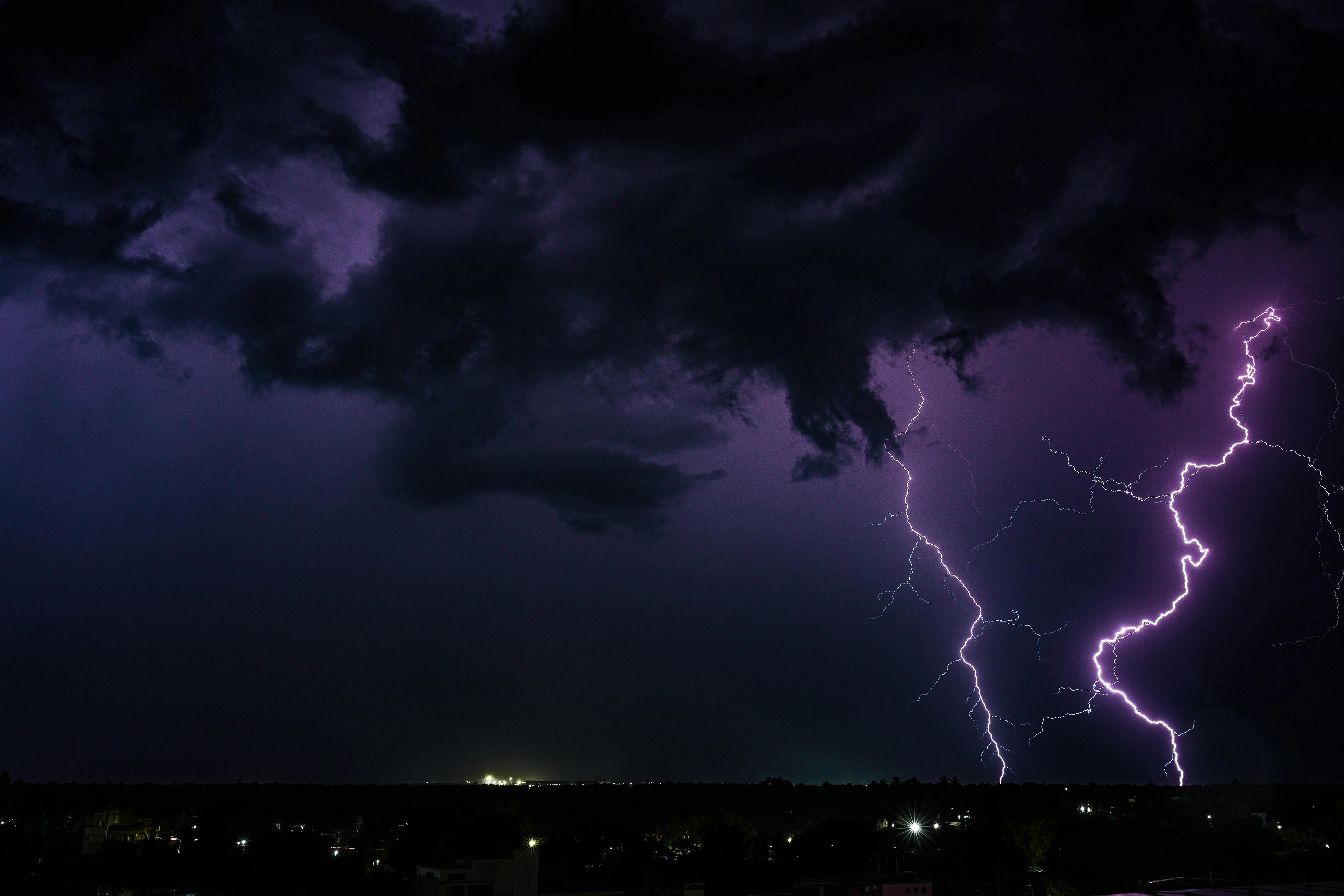 Thunderstorm over City at Night · Free Stock Photo
