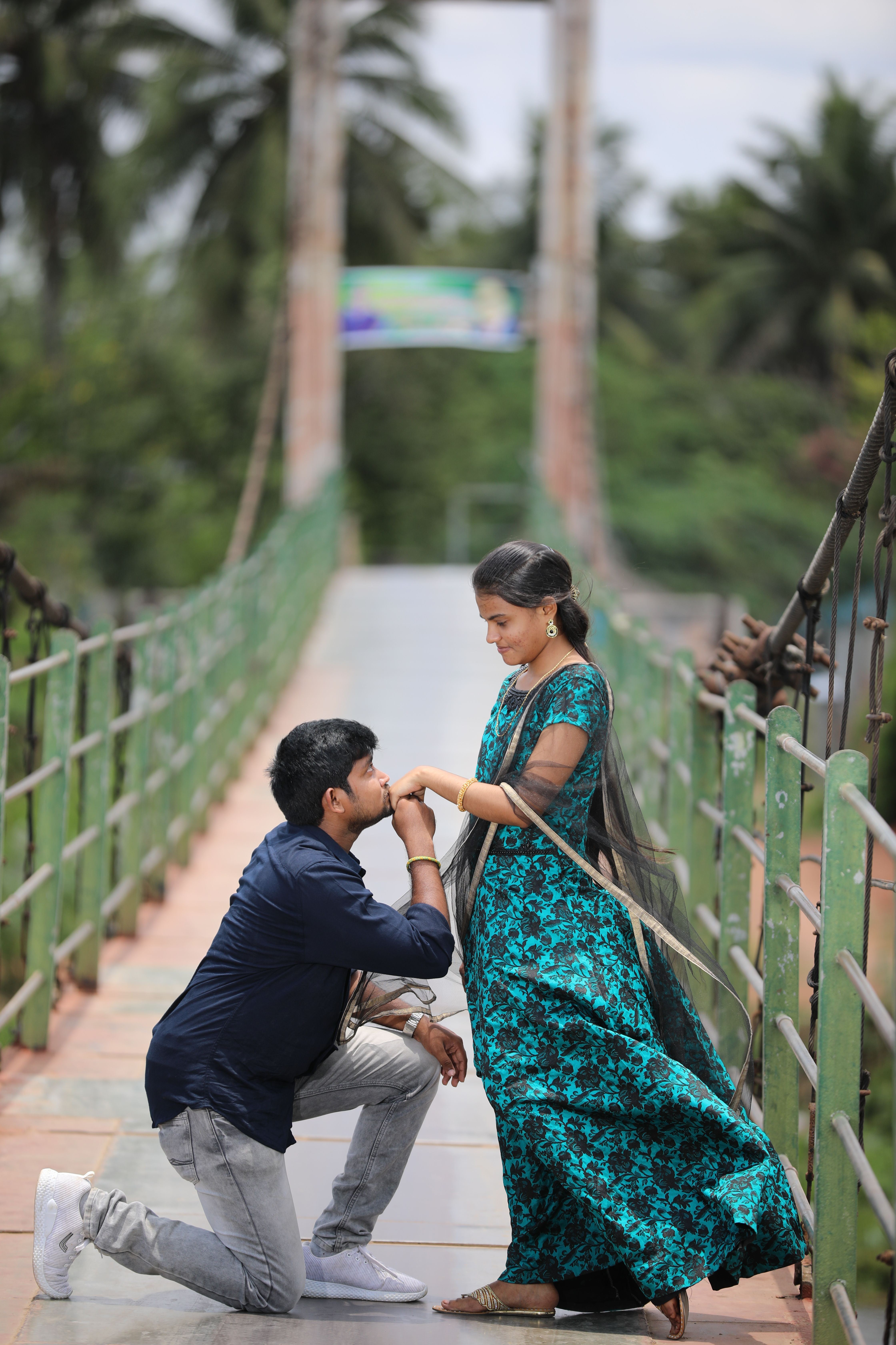 Man Proposing to a Woman in Mountains · Free Stock Photo
