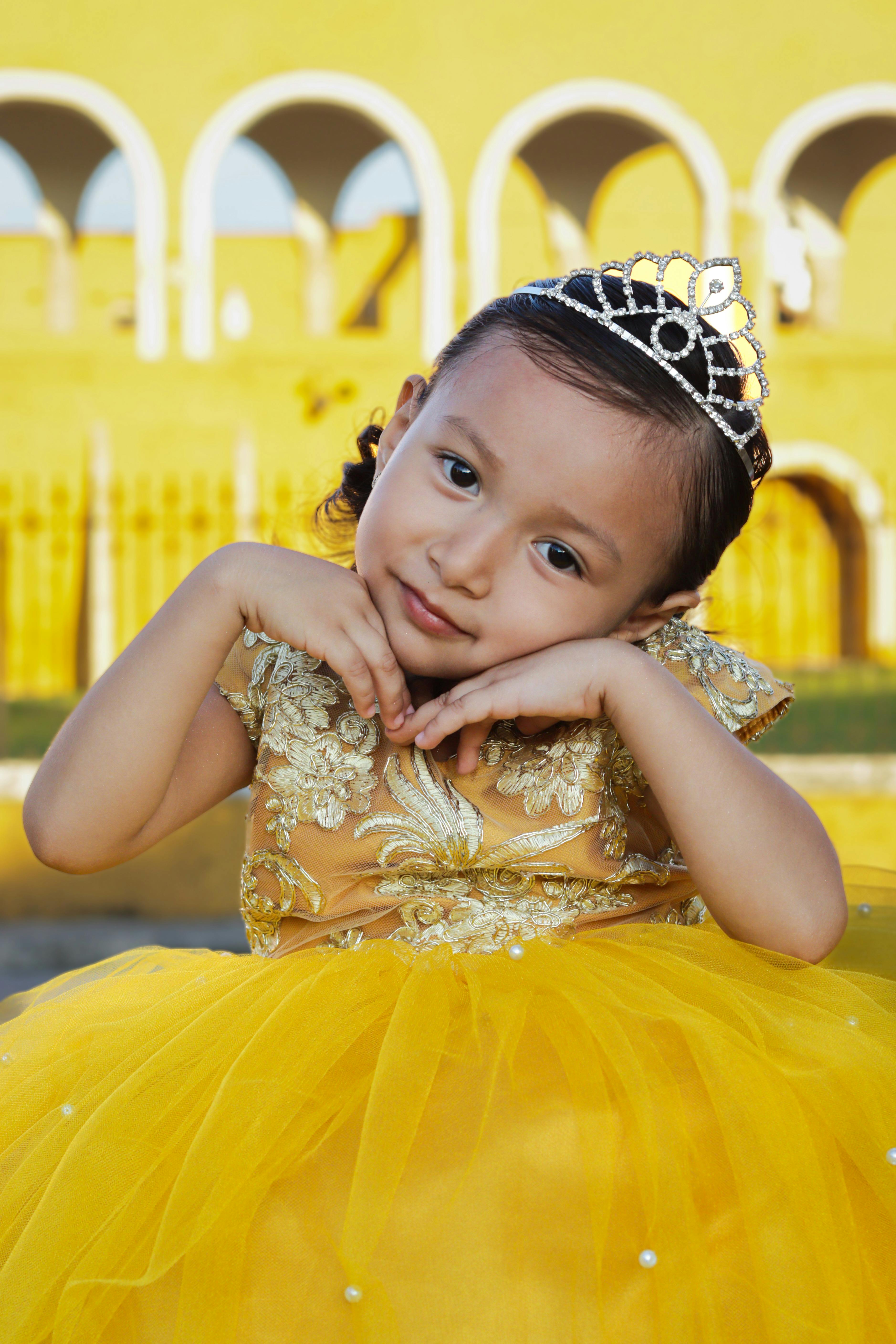 Child Model Posing in Ball Gown and Tiara · Free Stock Photo
