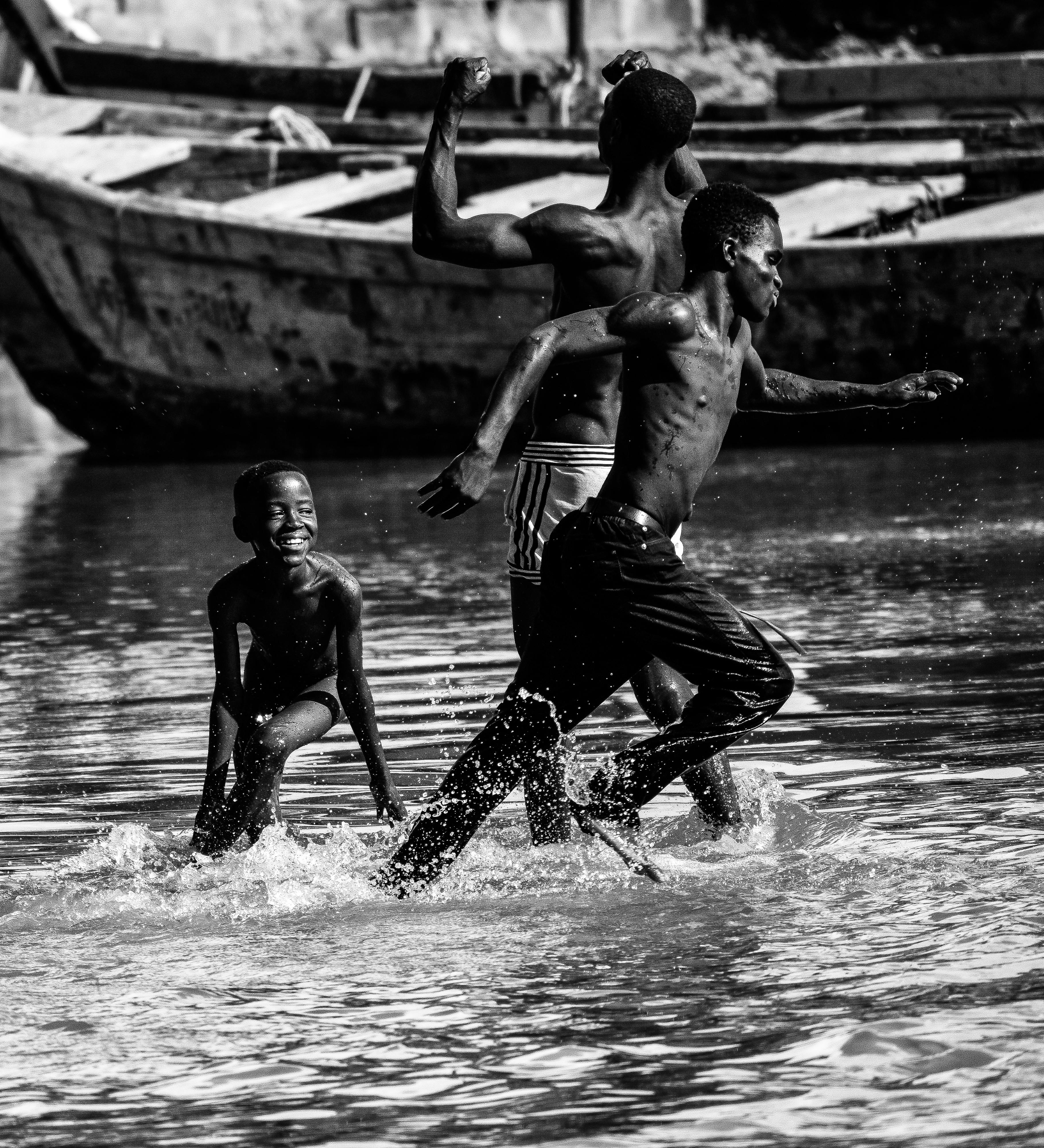 People Running in Water · Free Stock Photo