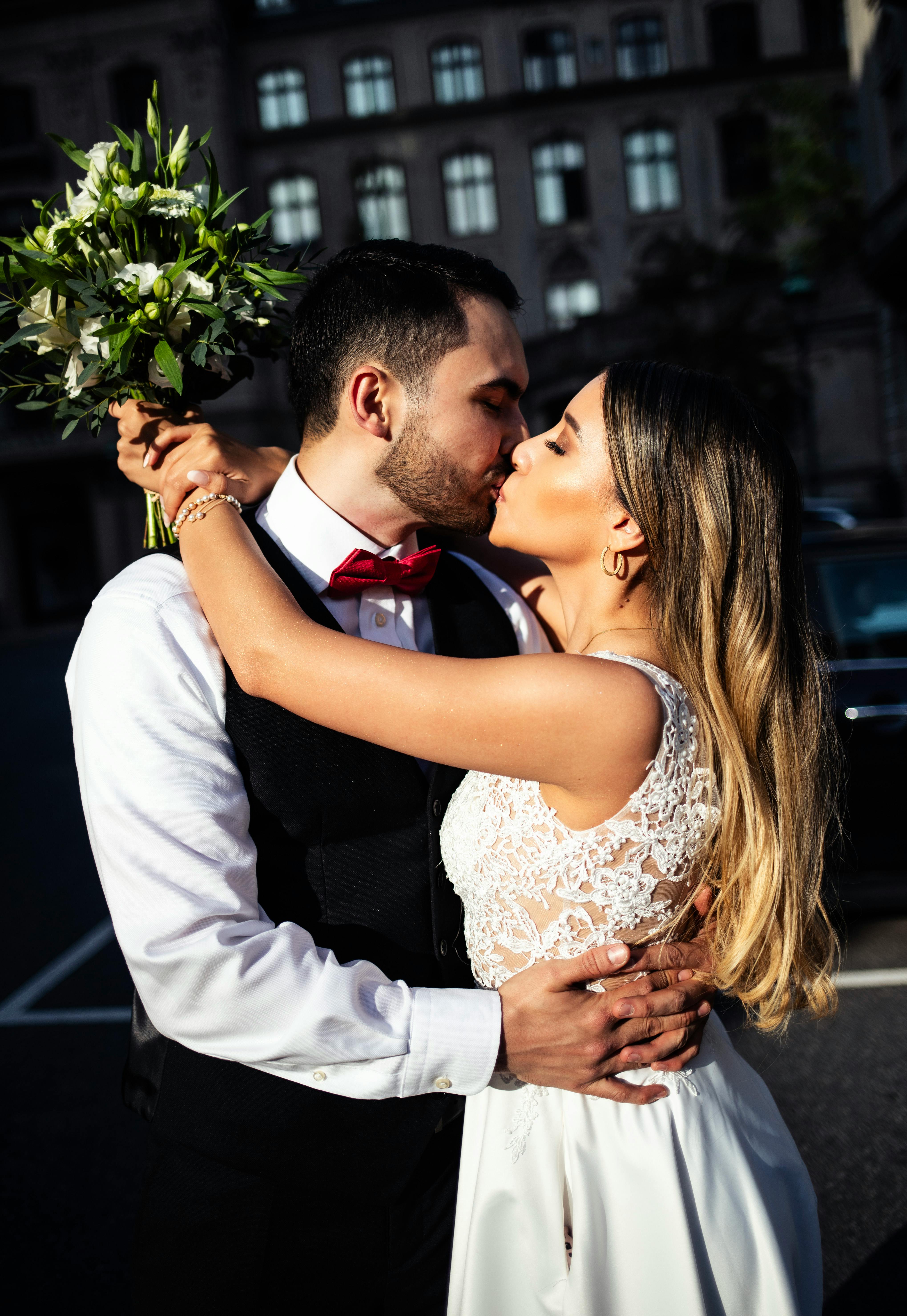 Groom Kissing Bride Neck · Free Stock Photo