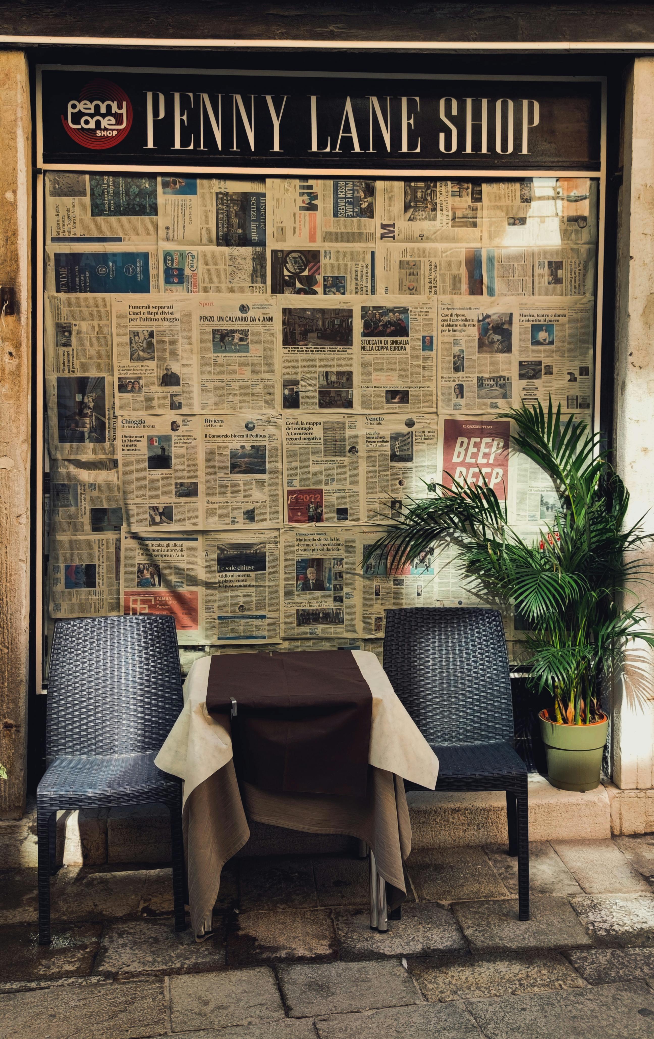 Table and Chairs at the Storefront · Free Stock Photo