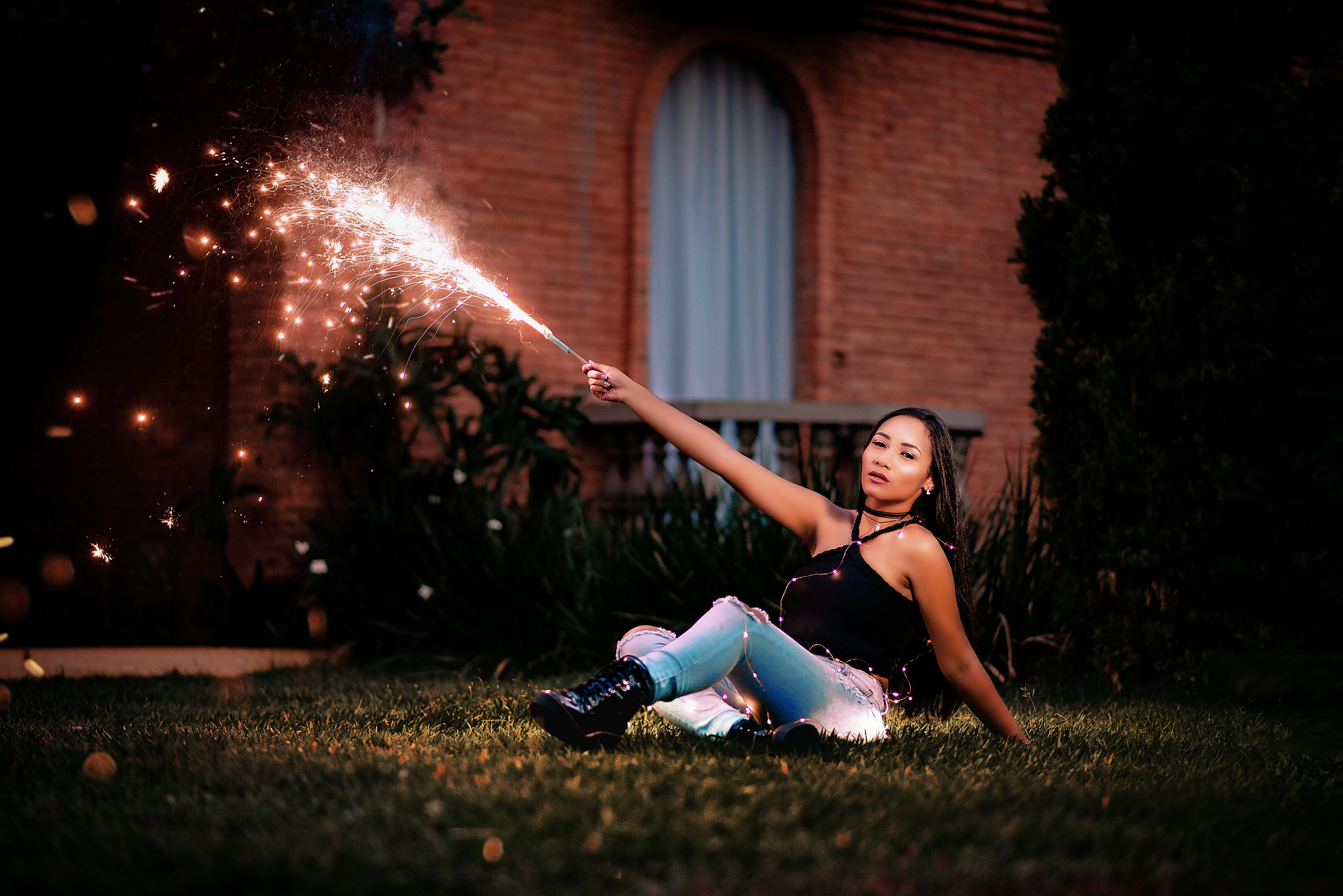 Woman Holding Fire Cracker · Free Stock Photo