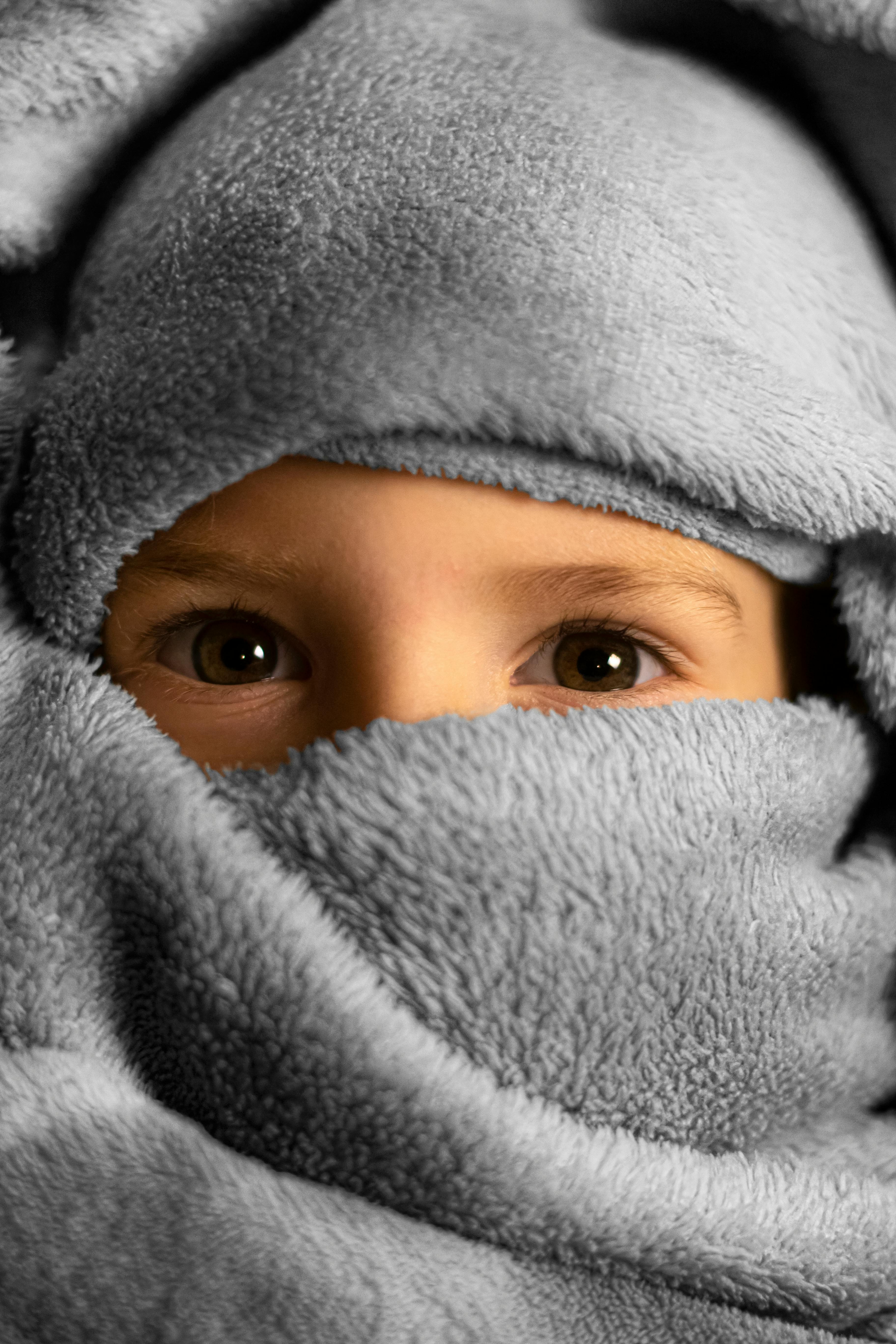 (Ninja Baby) A cute little kid wrapped in a blanket, looking like a ...