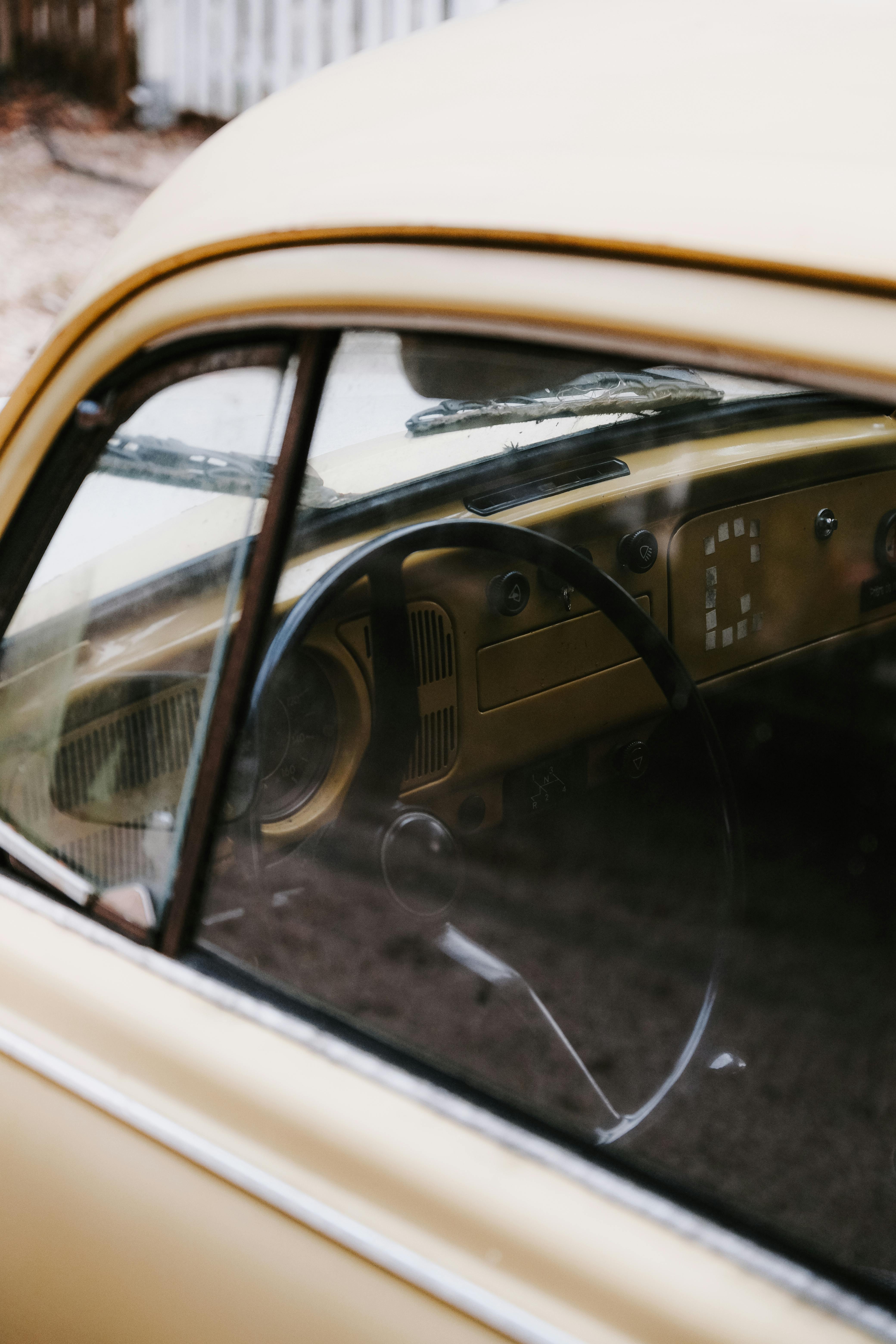 Steering Wheel behind Vintage Car Window · Free Stock Photo