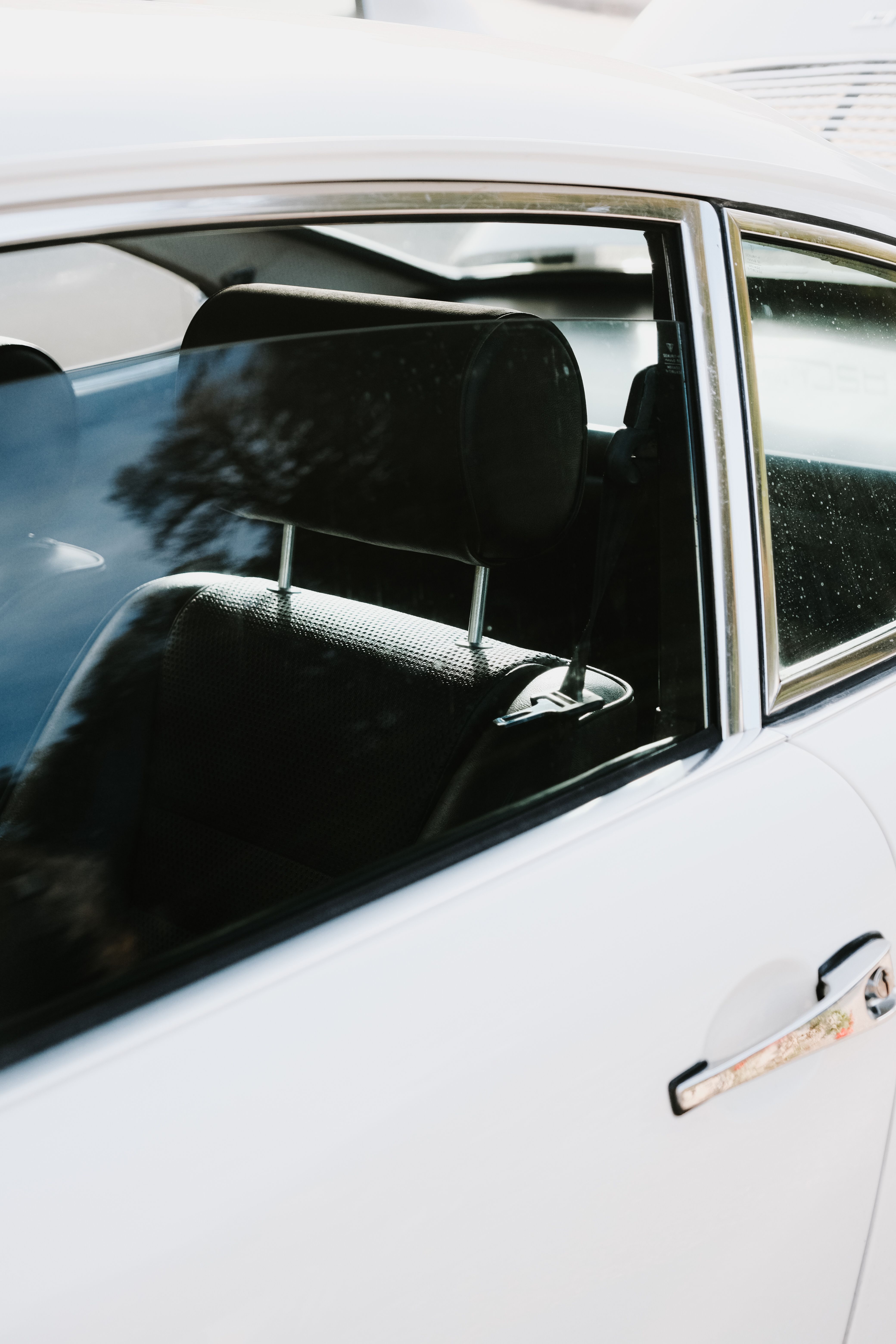 Seat and Window in White Car · Free Stock Photo