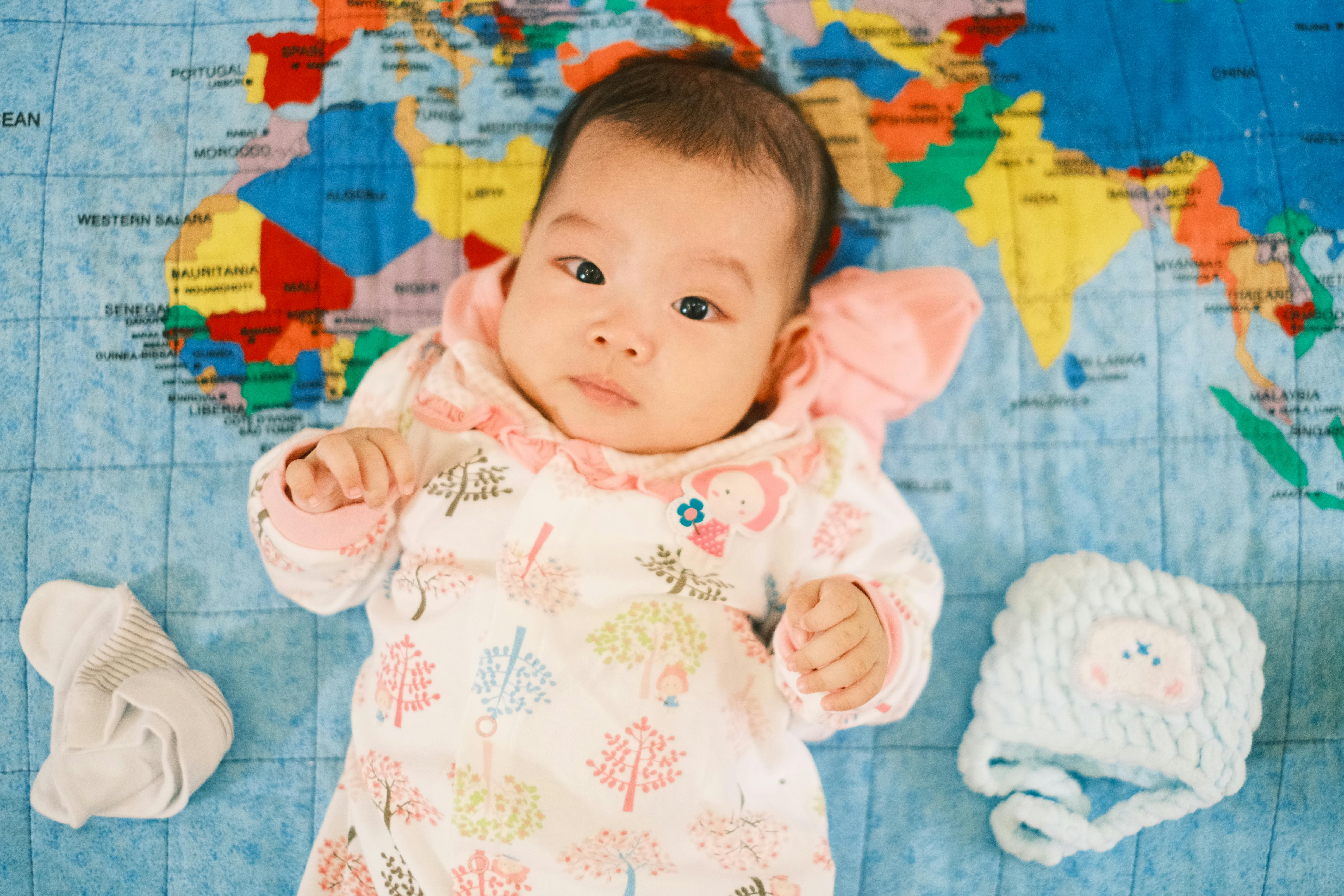 Selective Focus Photo of Little Girl Lying Forward on the Bed · Free ...