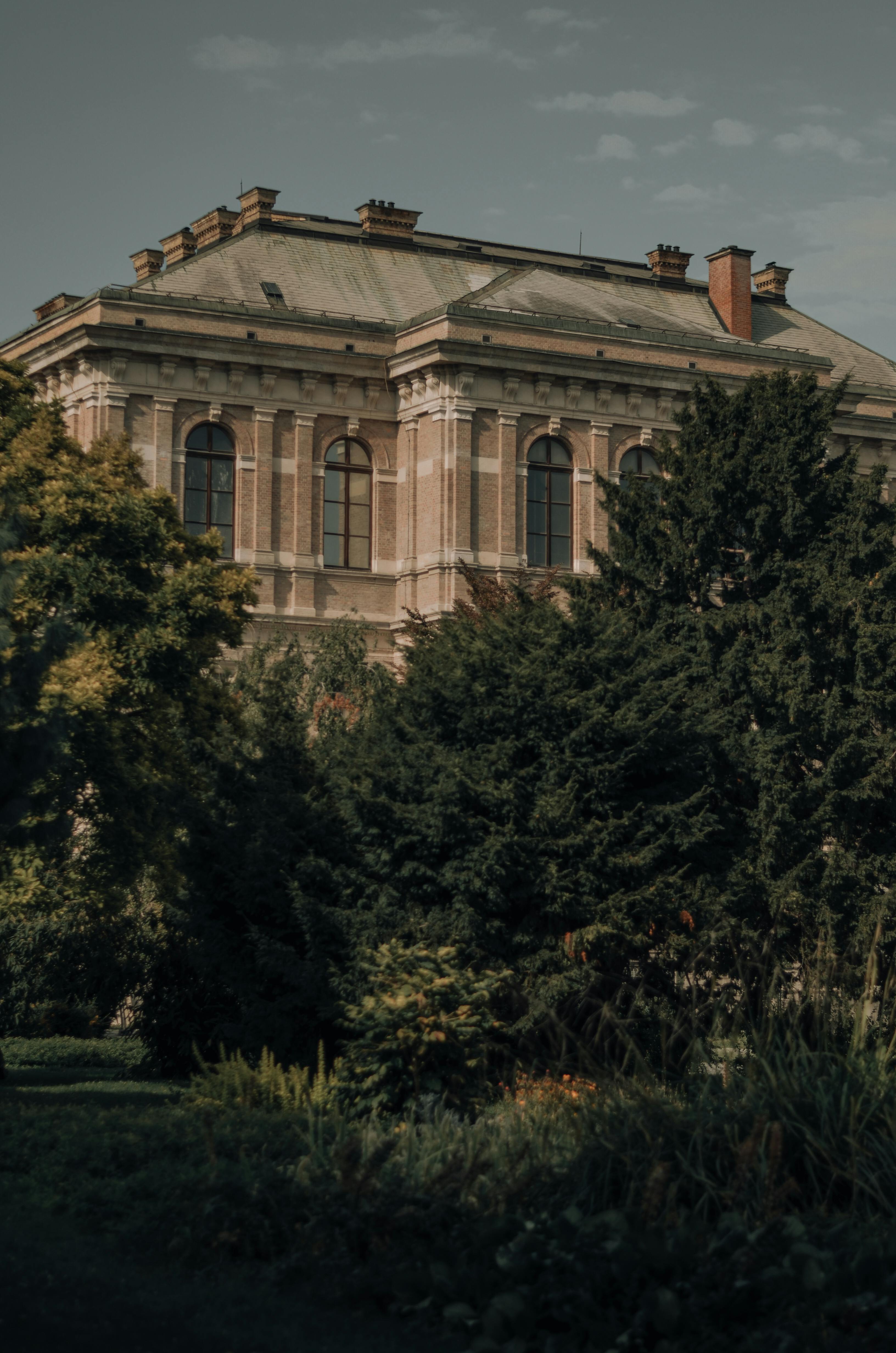 Traditional Mansion Among Trees · Free Stock Photo