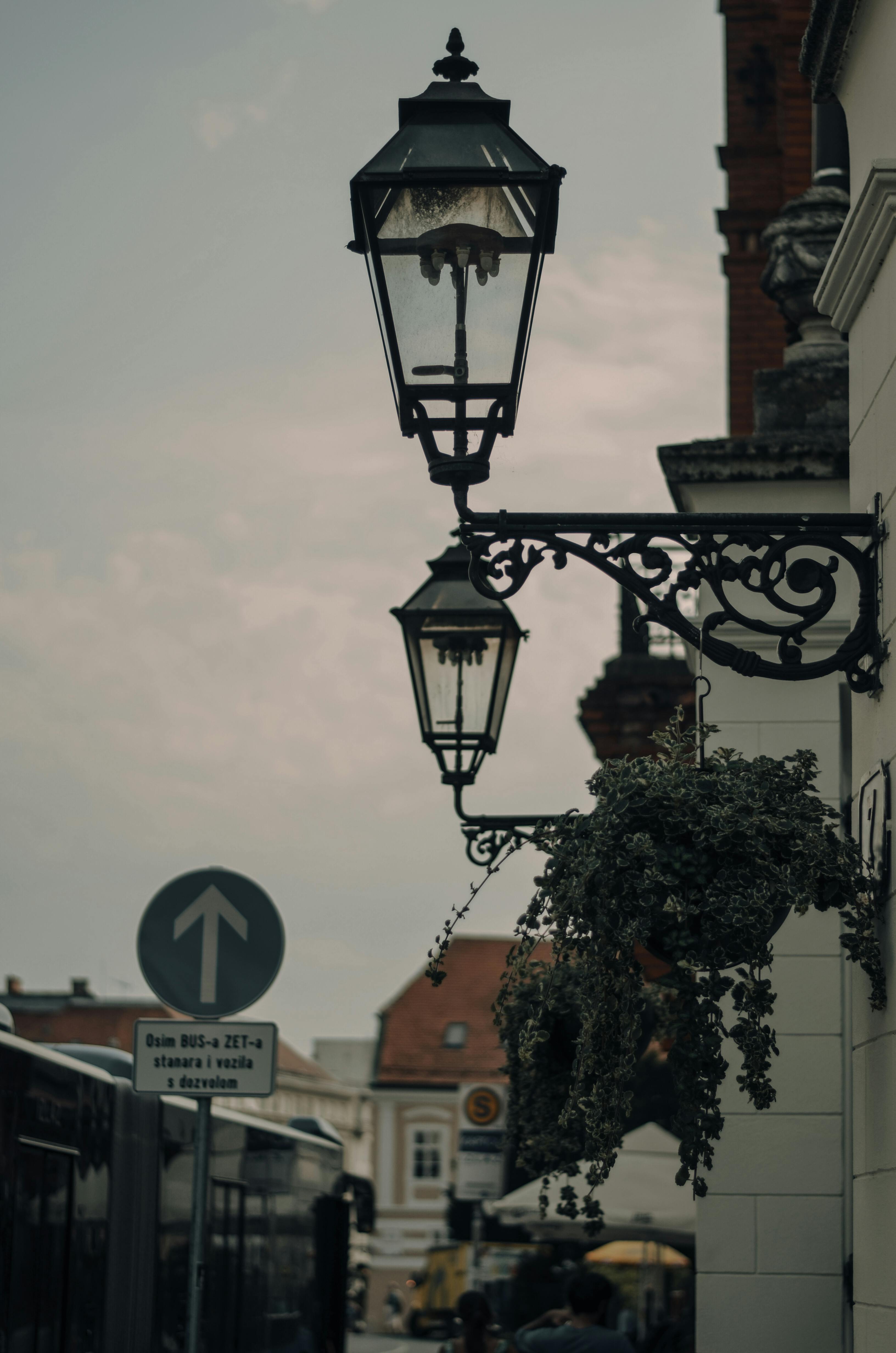 Photograph of a Street Lamp Near a Building · Free Stock Photo