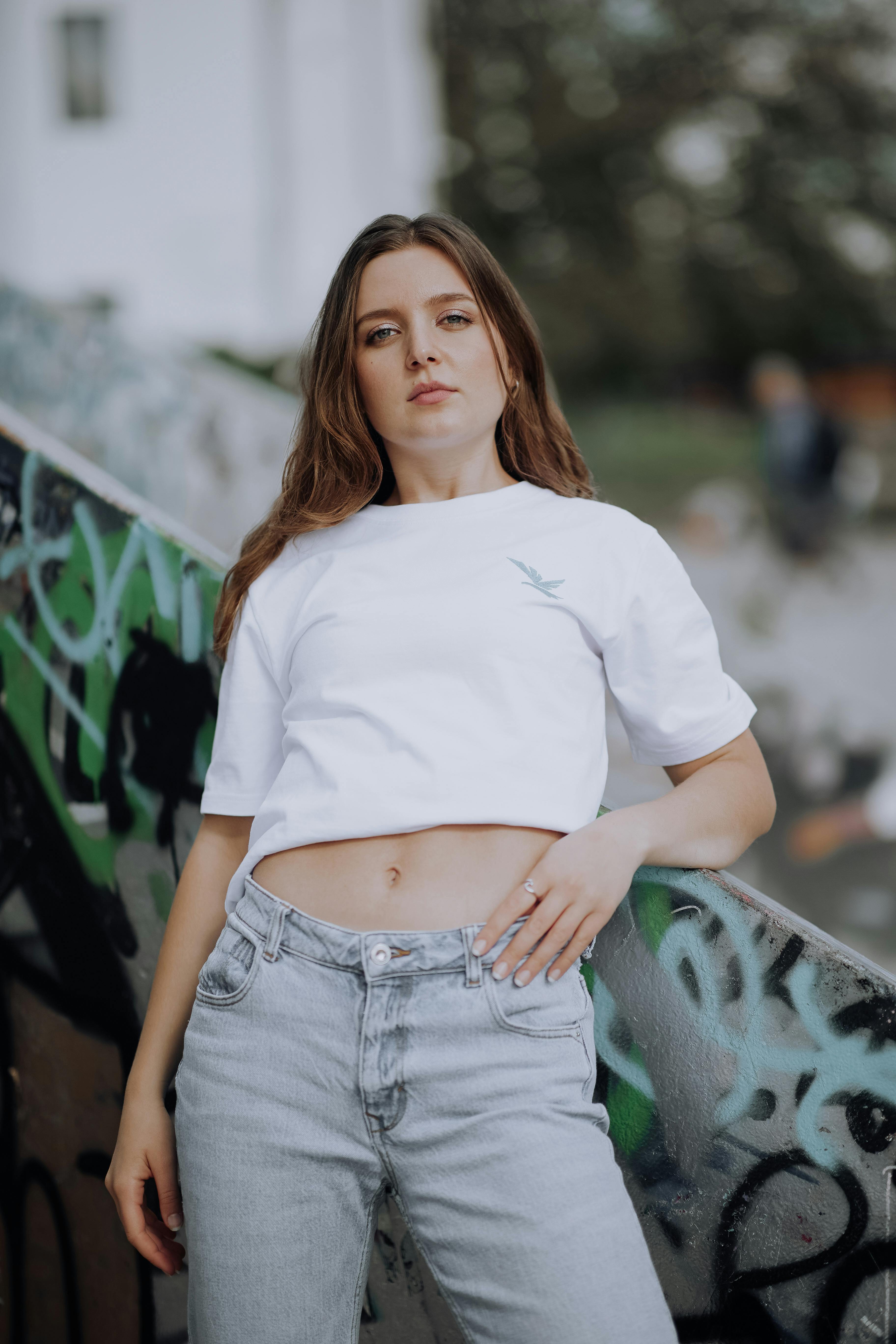 Model Posing in White T-shirt · Free Stock Photo