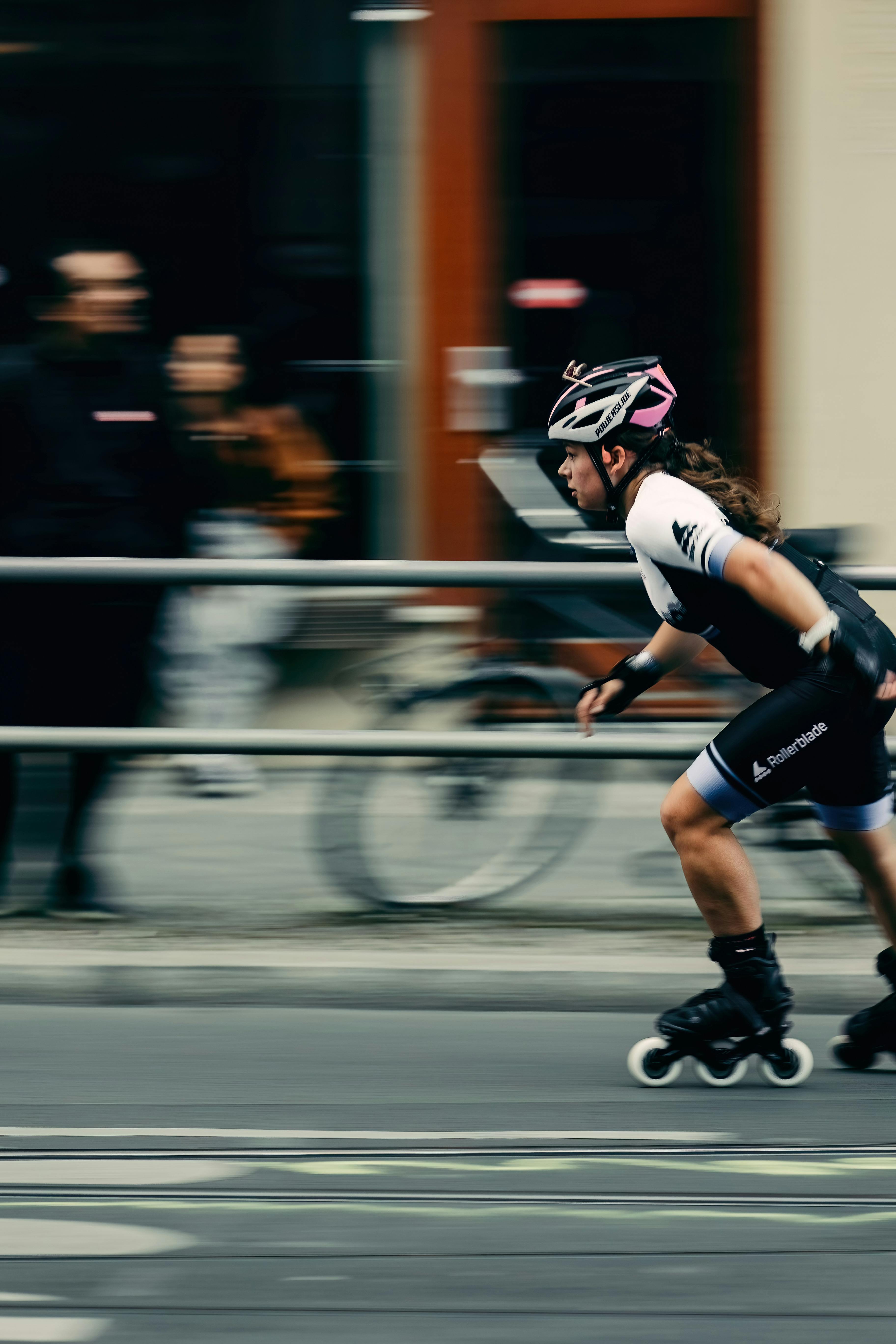 Woman Racing in Roller Skates on the Street · Free Stock Photo